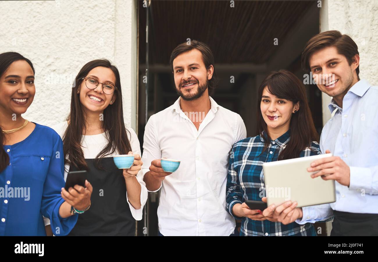 We work even after office hours. Portrait of a cheerful creative ...
