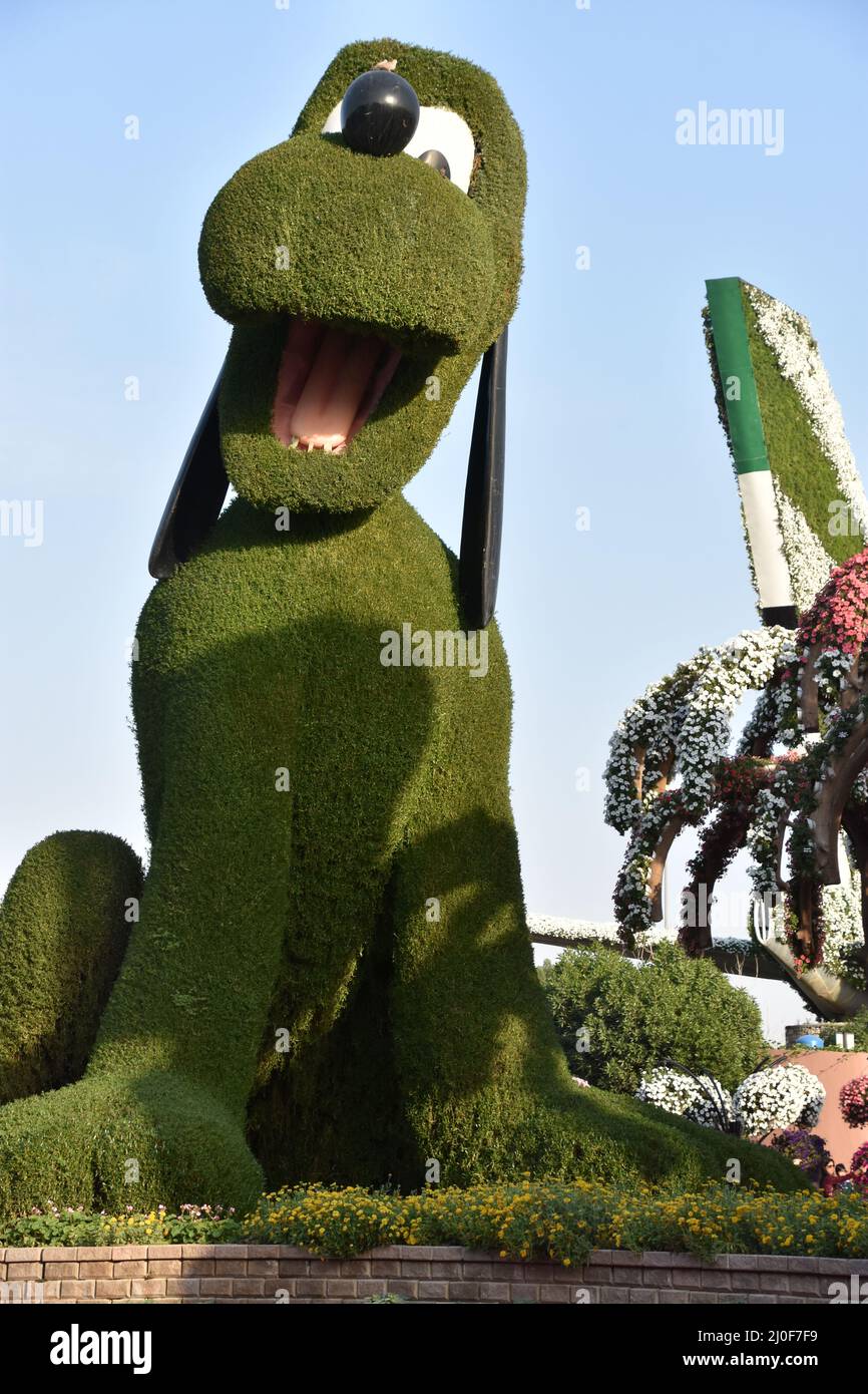 Disney characters at Dubai Miracle Garden in the UAE Stock Photo - Alamy