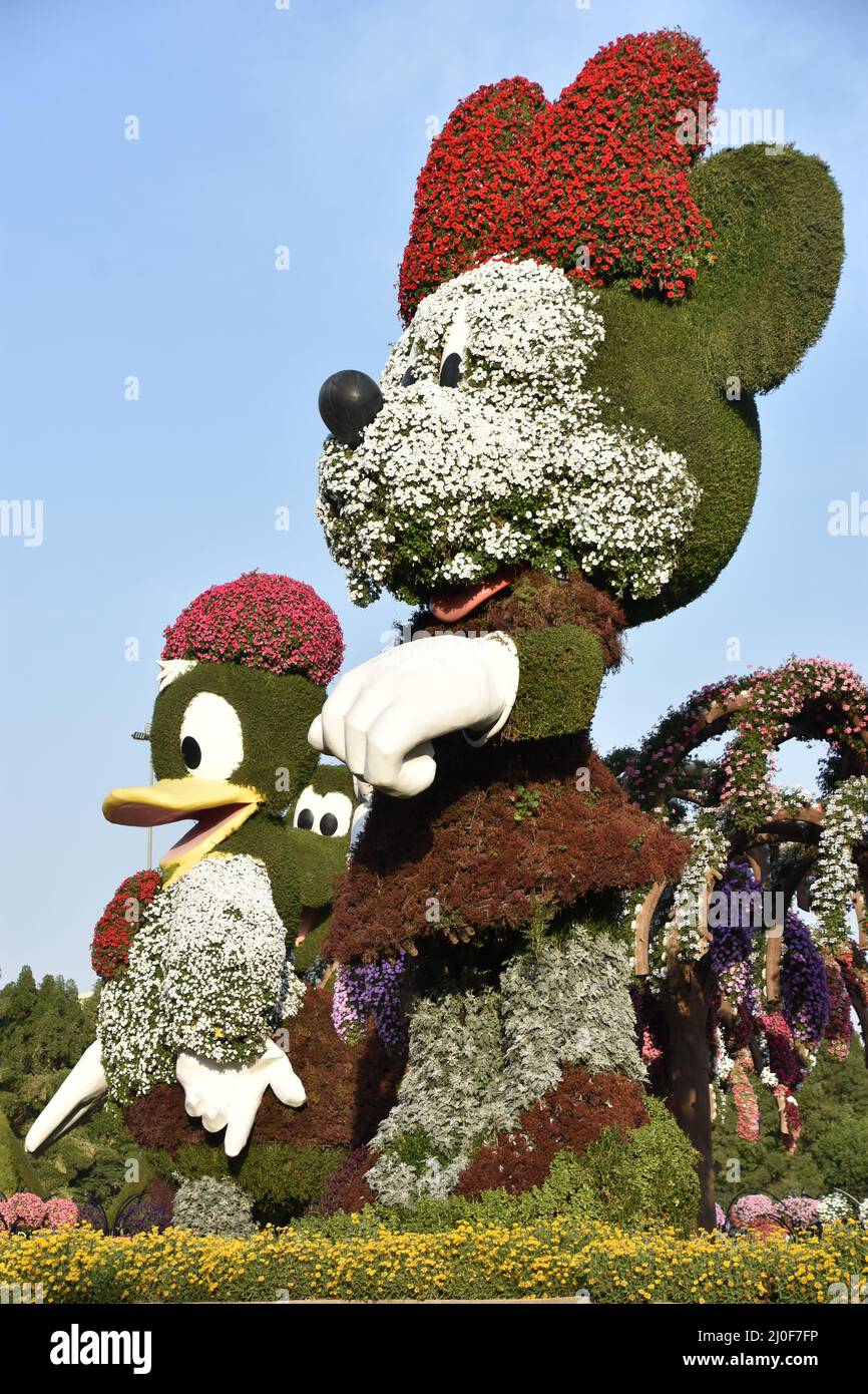 Disney characters at Dubai Miracle Garden in the UAE Stock Photo - Alamy