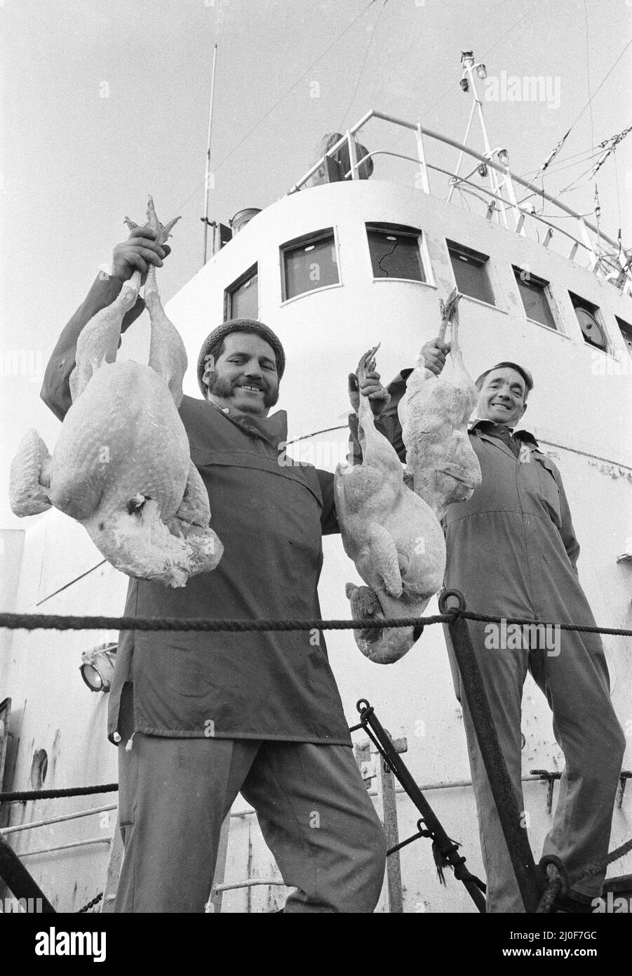 Crew members of the Hull trawler Lord Nelson show off their Christmas ...