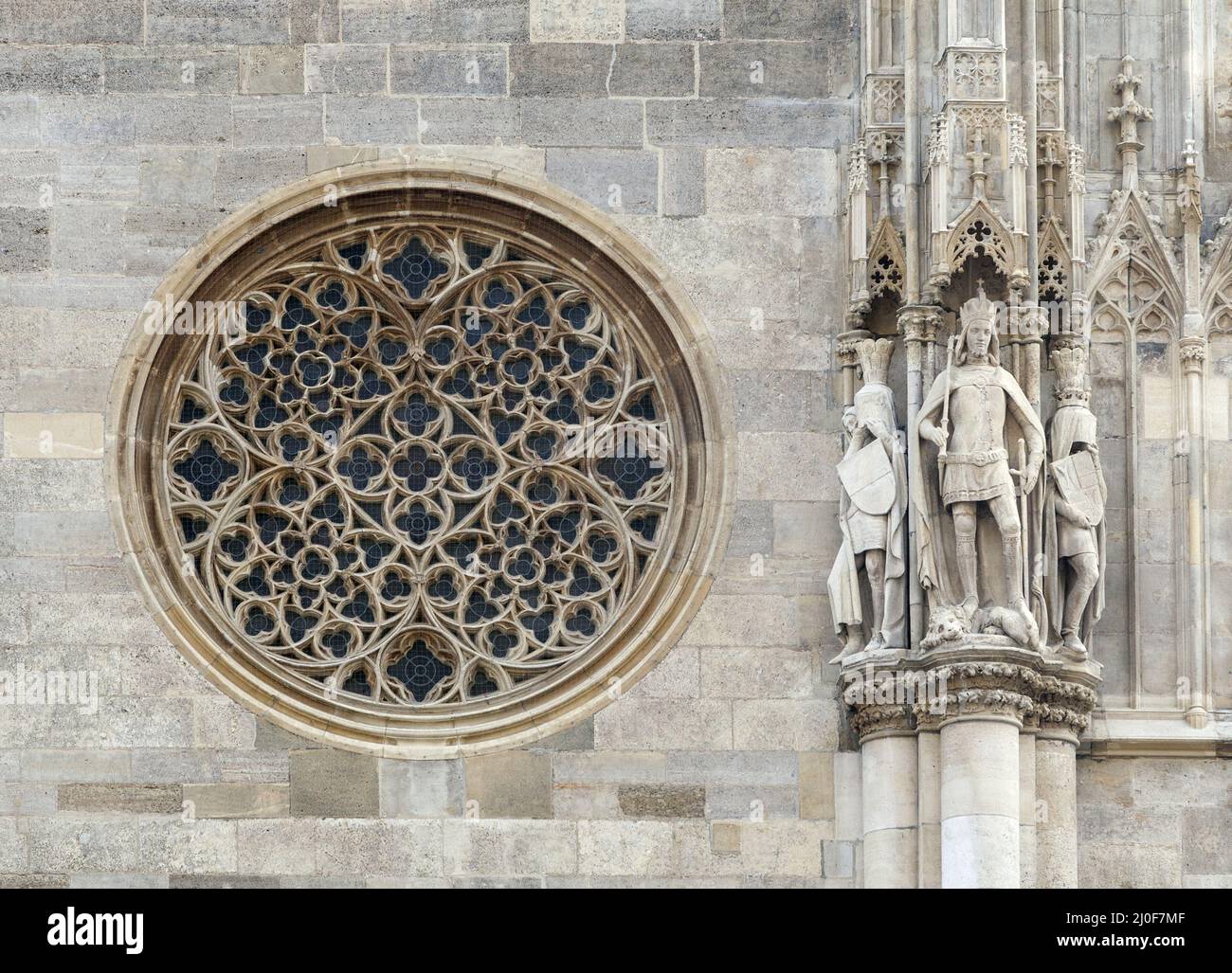 Round gothic window on the facade of the St. Stephen's cathedral ...