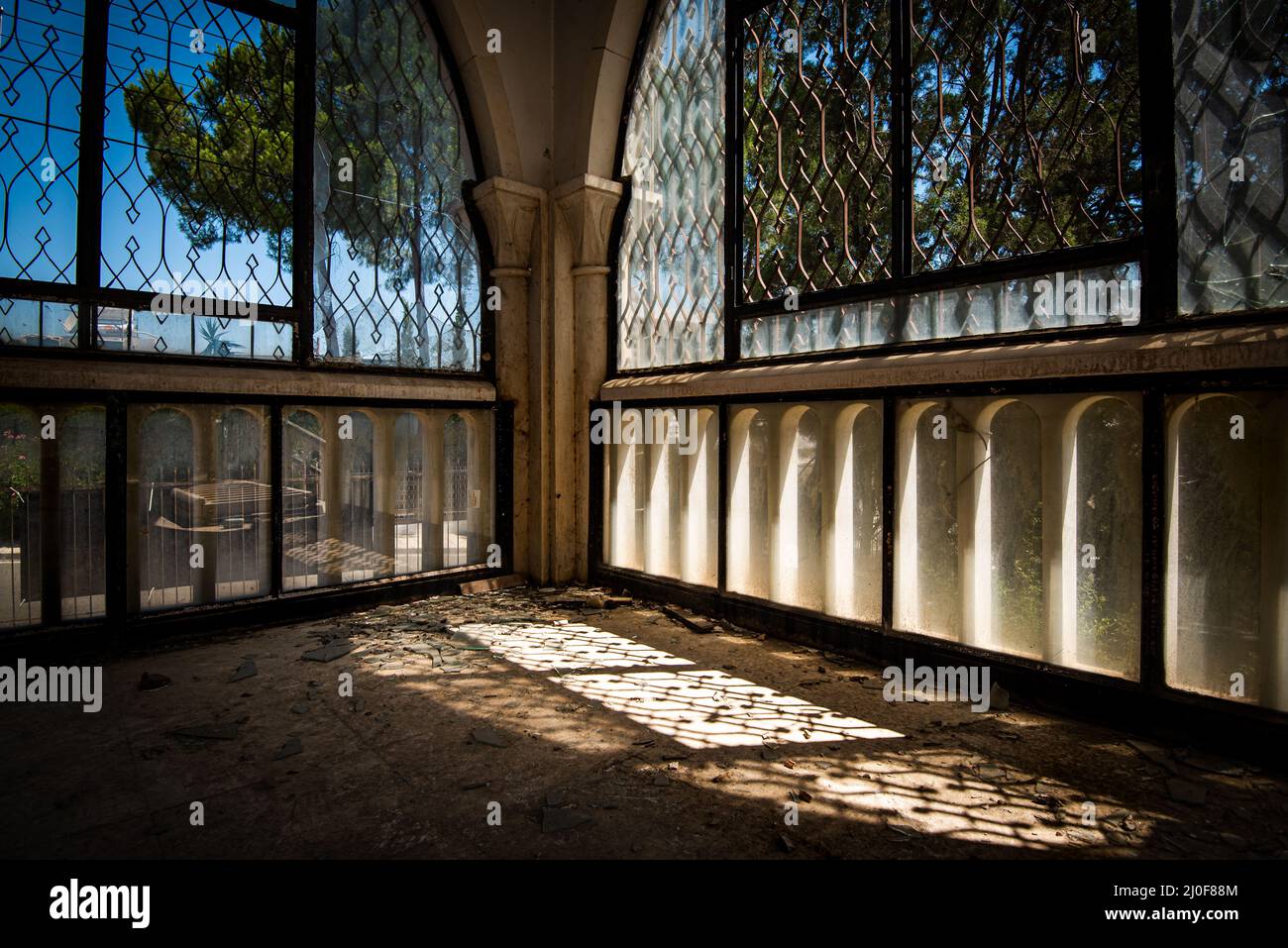 Abandoned house room with view through broken windows and doors Stock ...