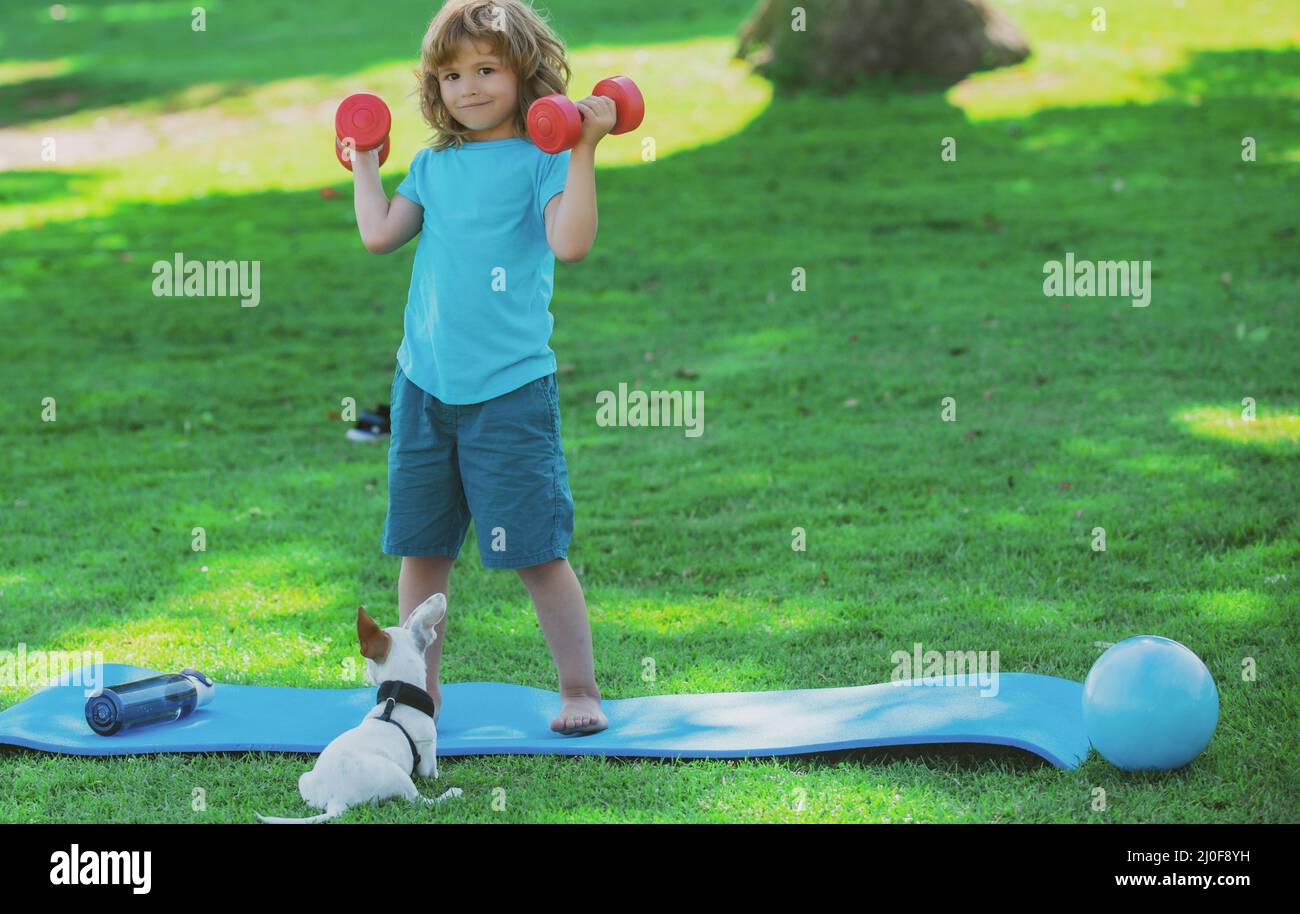 Sporty child with dumbbells. Kids sport and fitness, health and energy ...