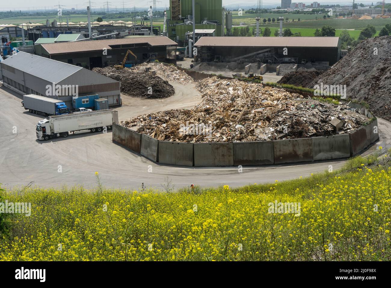 Waste wood storage in a landfill Stock Photo - Alamy