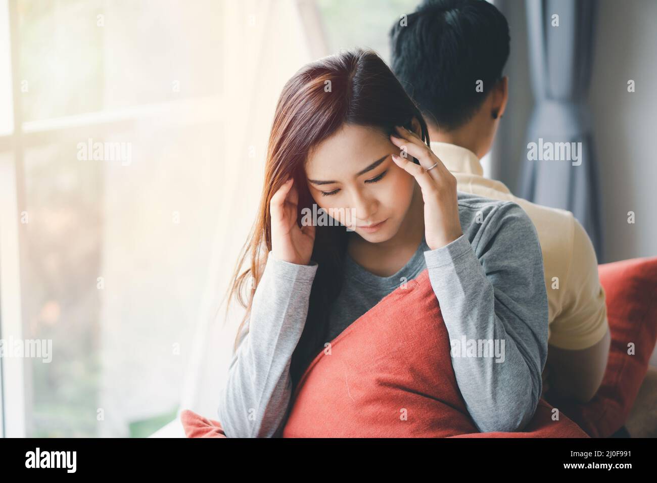 Angry couple arguing behind sad hi-res stock photography and images - Alamy
