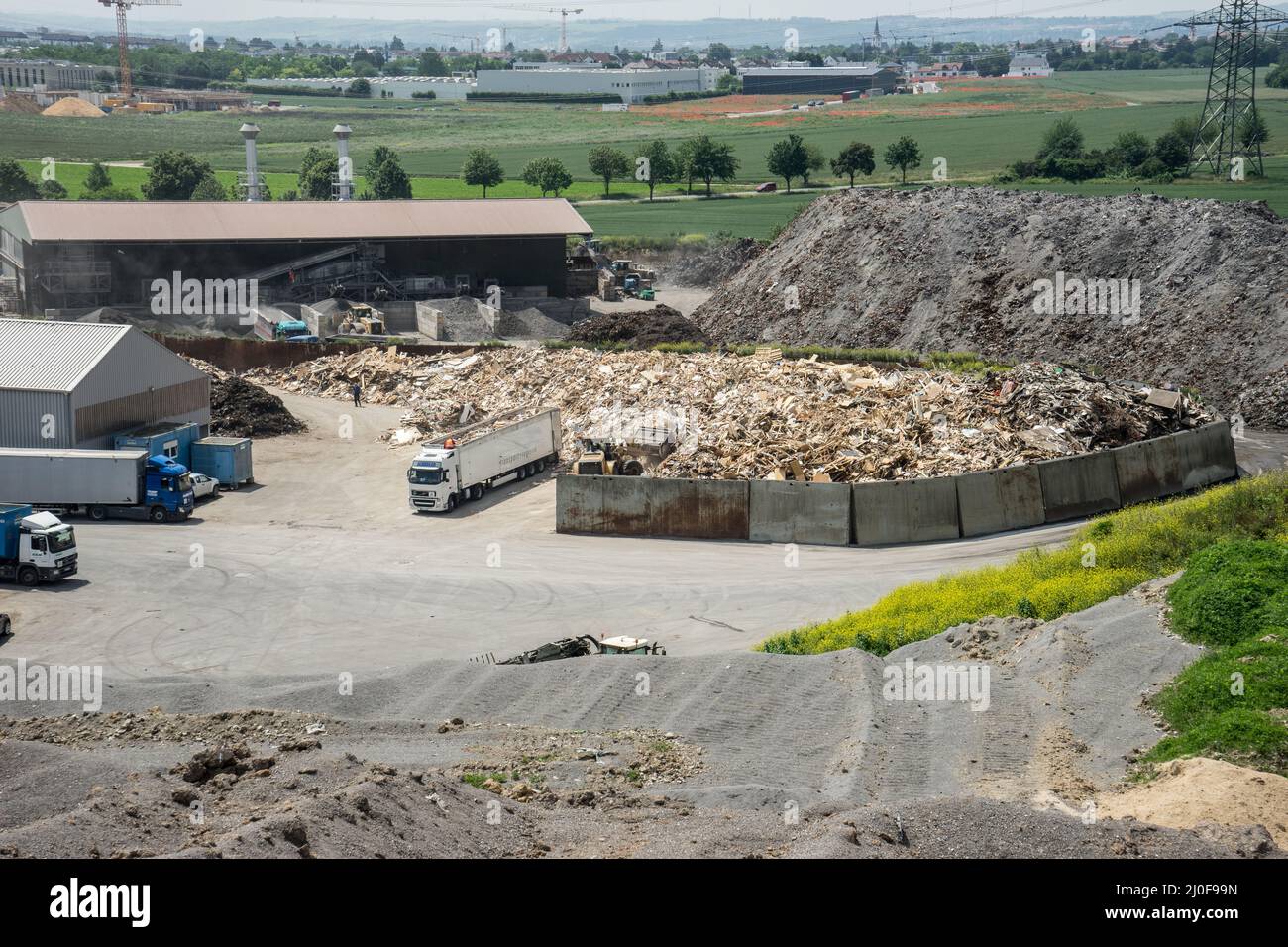 Waste wood storage in a landfill Stock Photo - Alamy