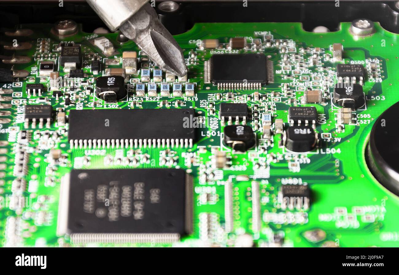 Technician repairing electronic circuit board hi-res stock photography and images - Alamy