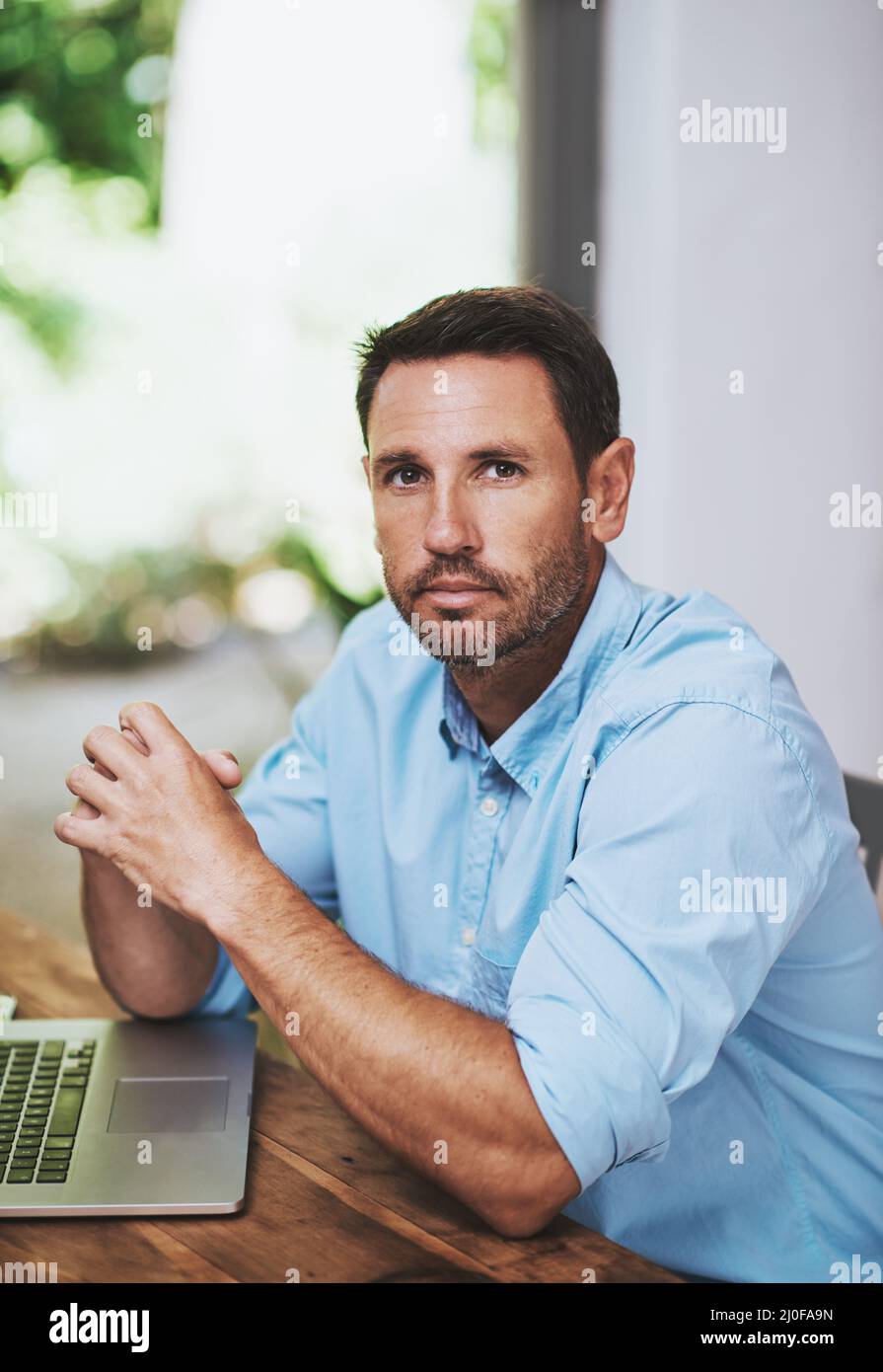 I never shy away from hard work. Cropped portrait of a businessman ...