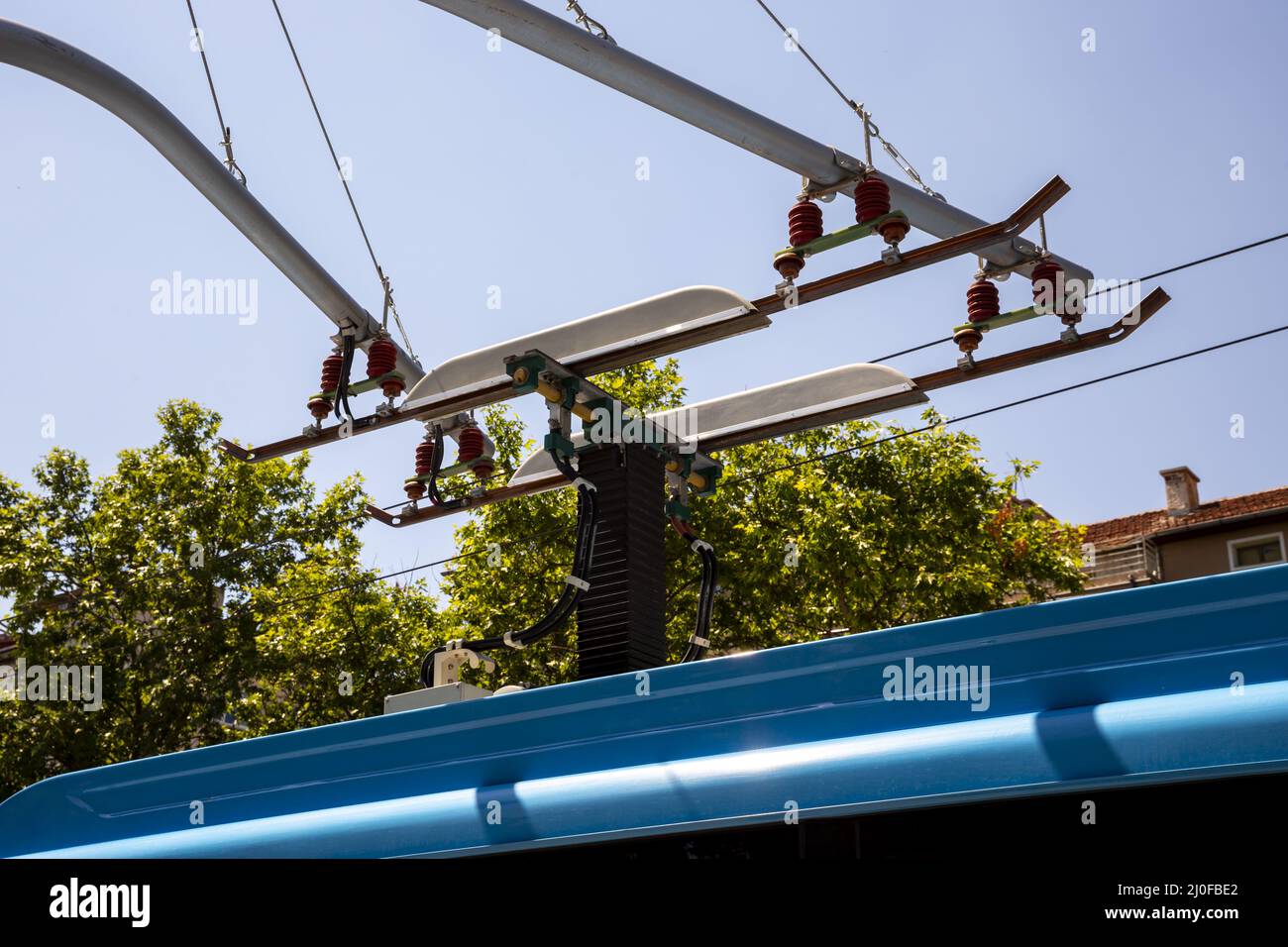 Electric bus electric overhead lines Stock Photo - Alamy