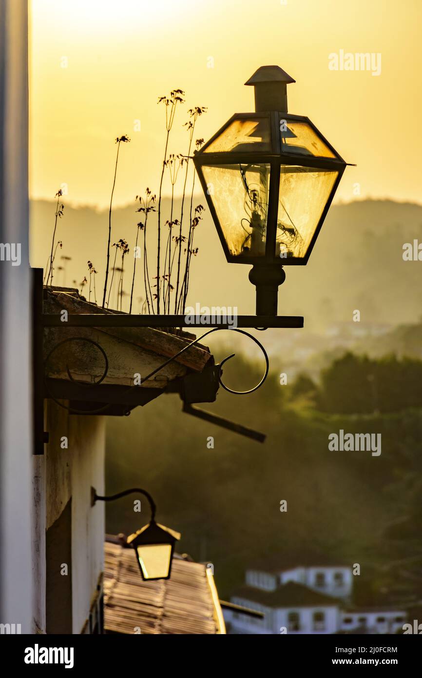 Old street lighting with lantern in colonial style at sunset Stock ...