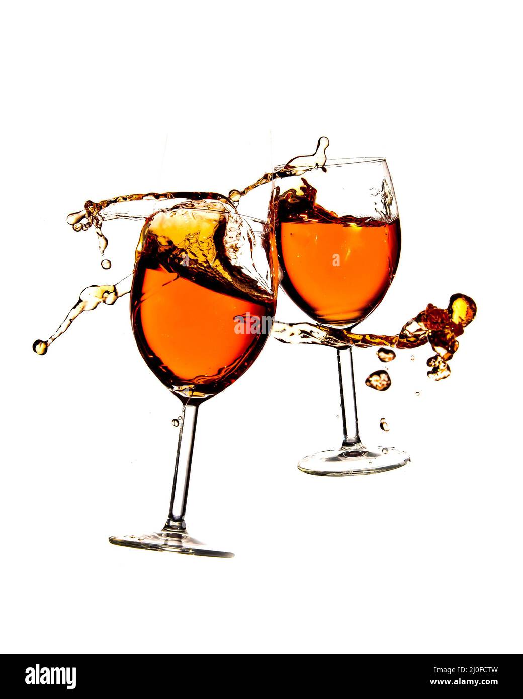 Broken wine glasses with wine splashes on a white background Stock ...