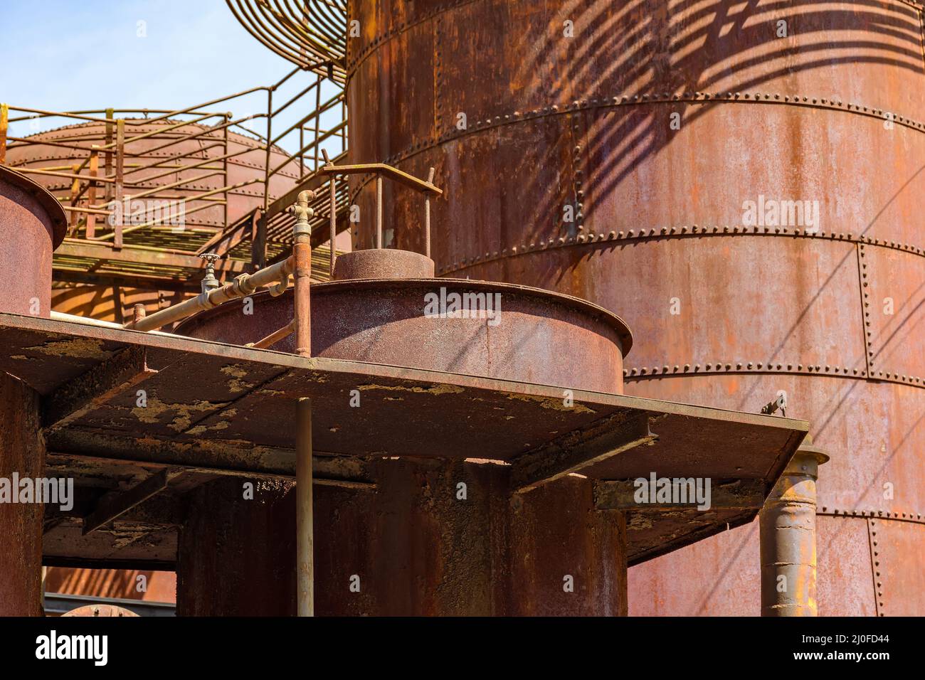 Corroded and rusty gears, tanks and pipes Stock Photo - Alamy