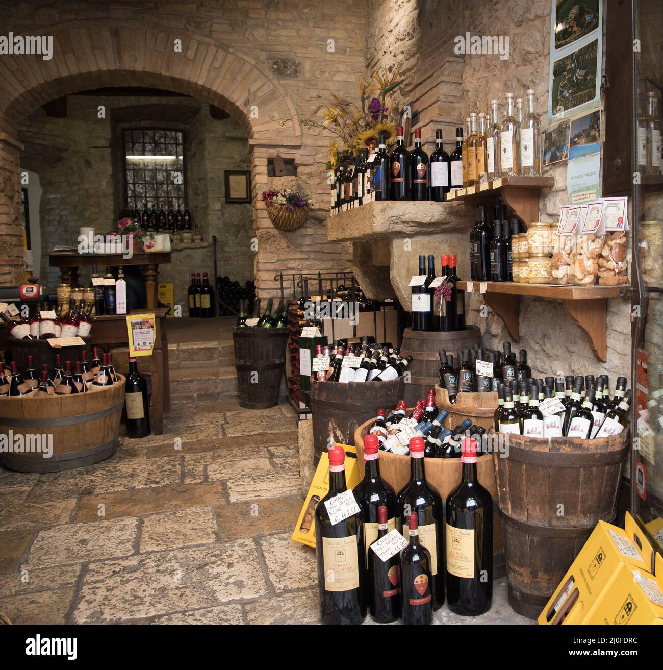 Wine shop selling variety of wines, San Giminango, Italy Stock Photo ...