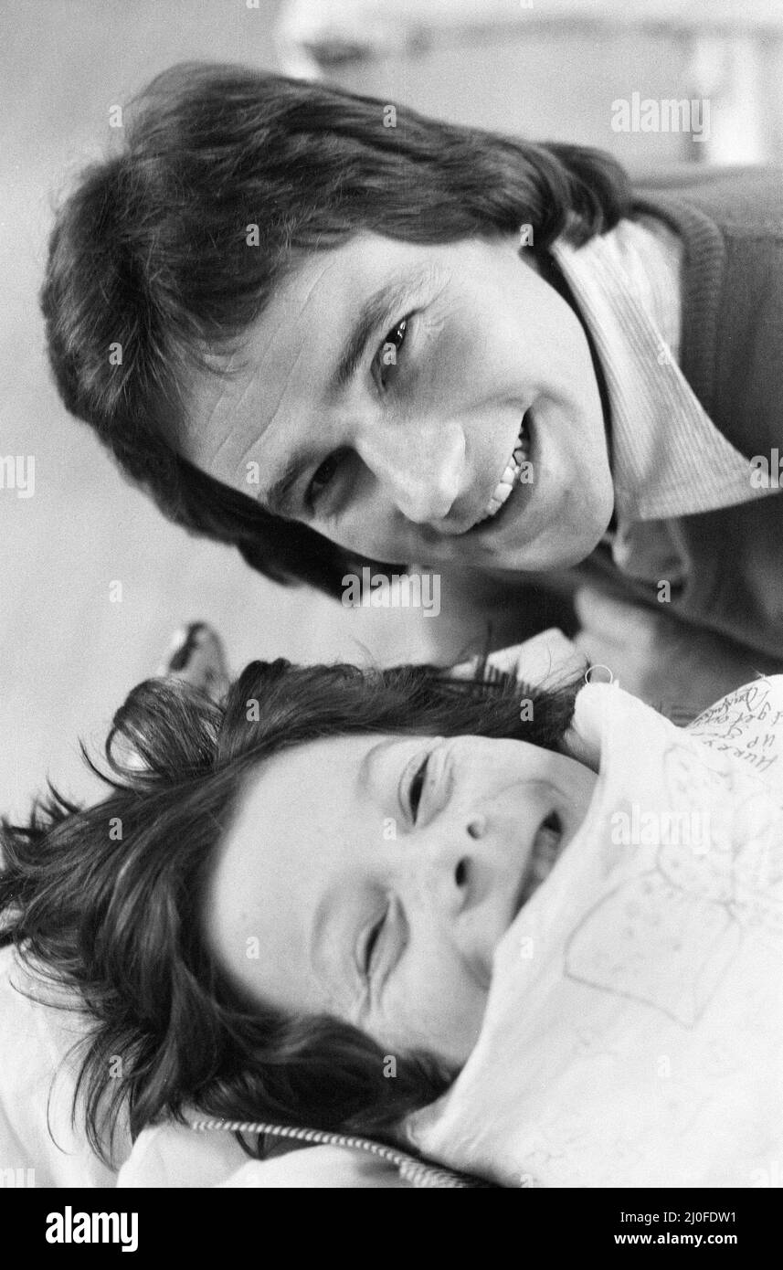 British Motorcycle road racer Barry Sheene with young fan Tony Vickers ...