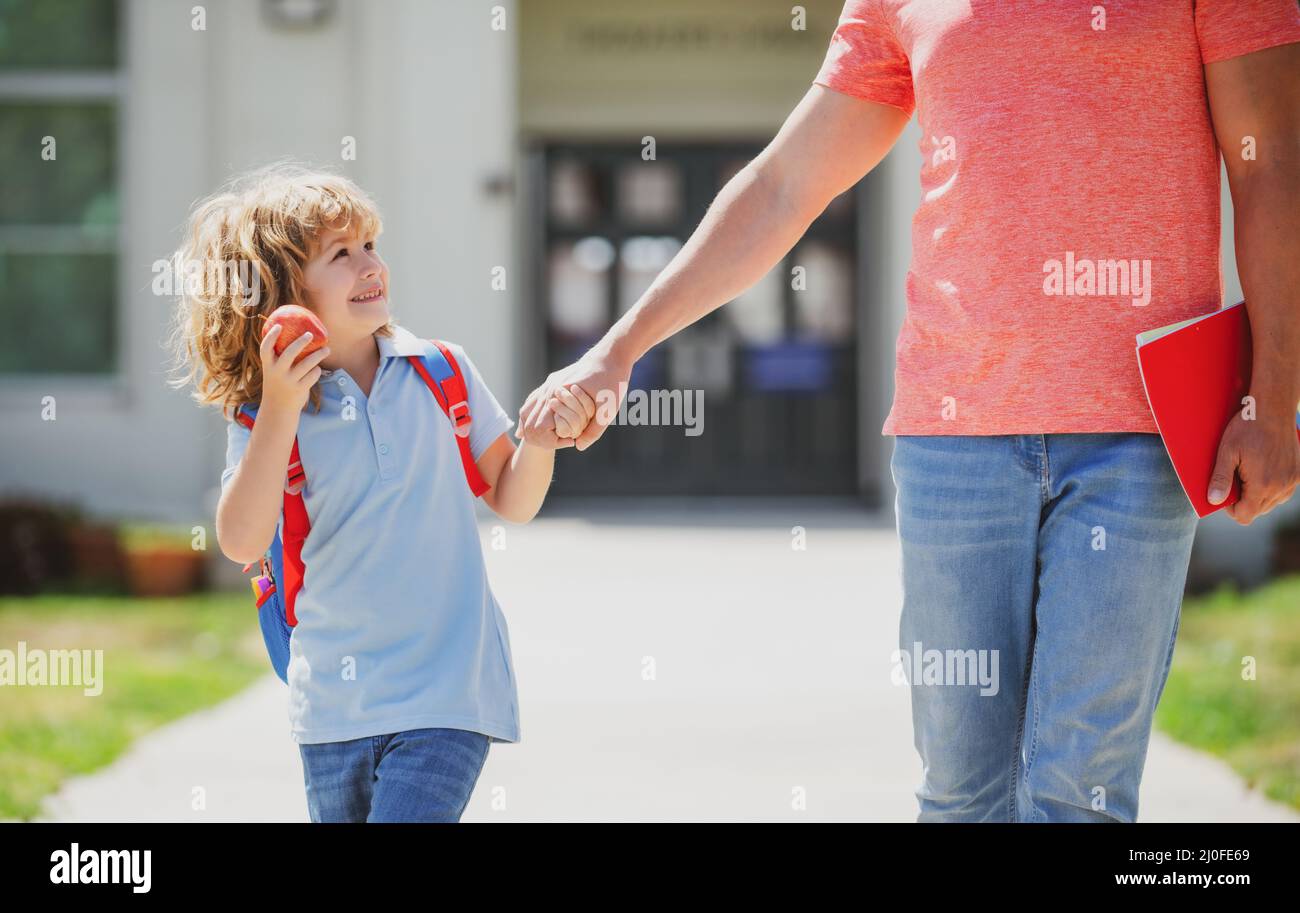 Father and son run with father come back from school. Family, education ...