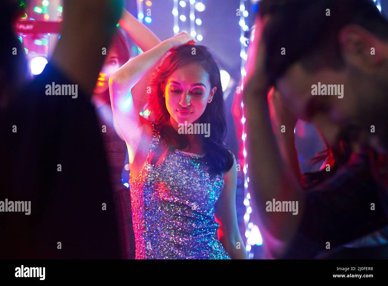 Woman dancing on dancefloor hi-res stock photography and images - Alamy
