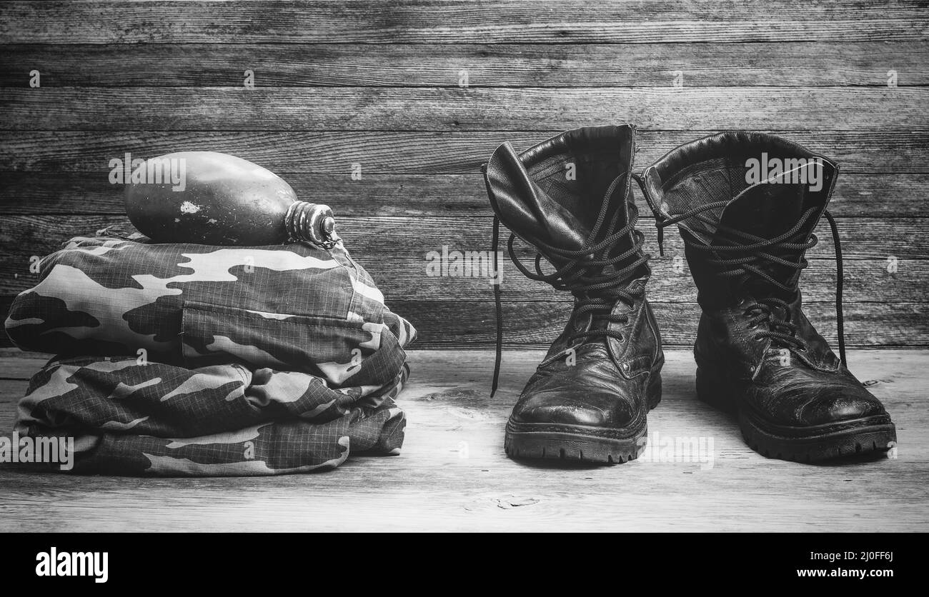 Old leather black mens boots Stock Photo - Alamy