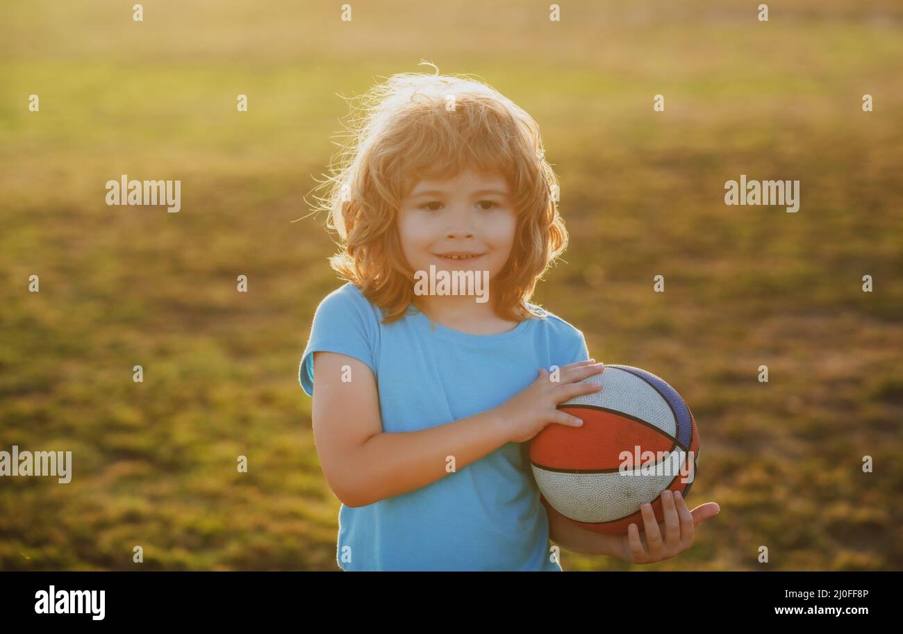 Kid playing basketball. Activity and sport for kids Stock Photo - Alamy