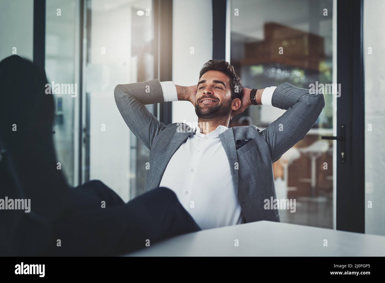Relaxed man feet up in hi-res stock photography and images - Alamy