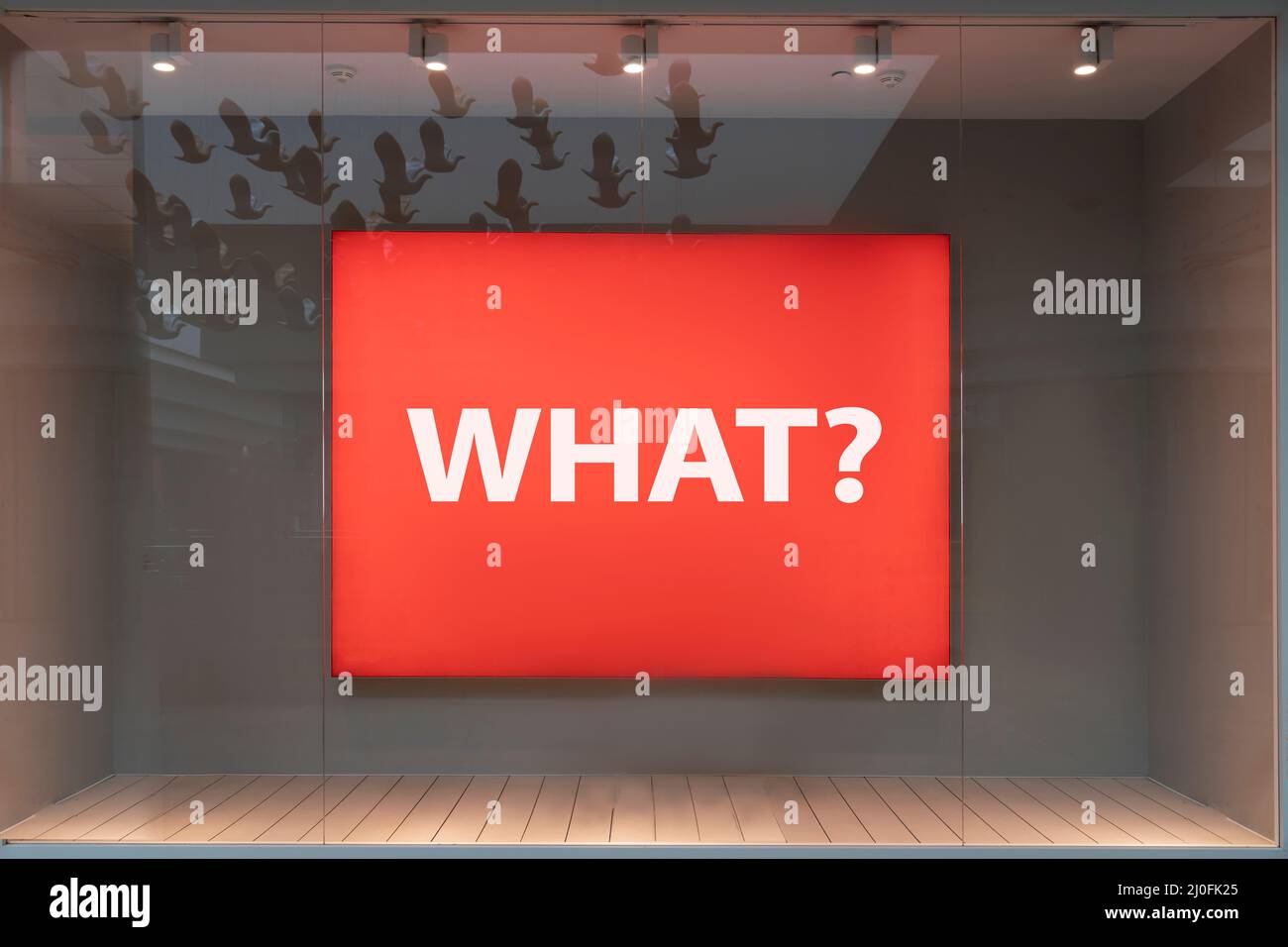 what is the word on the banner in the shop window, the concept question ...