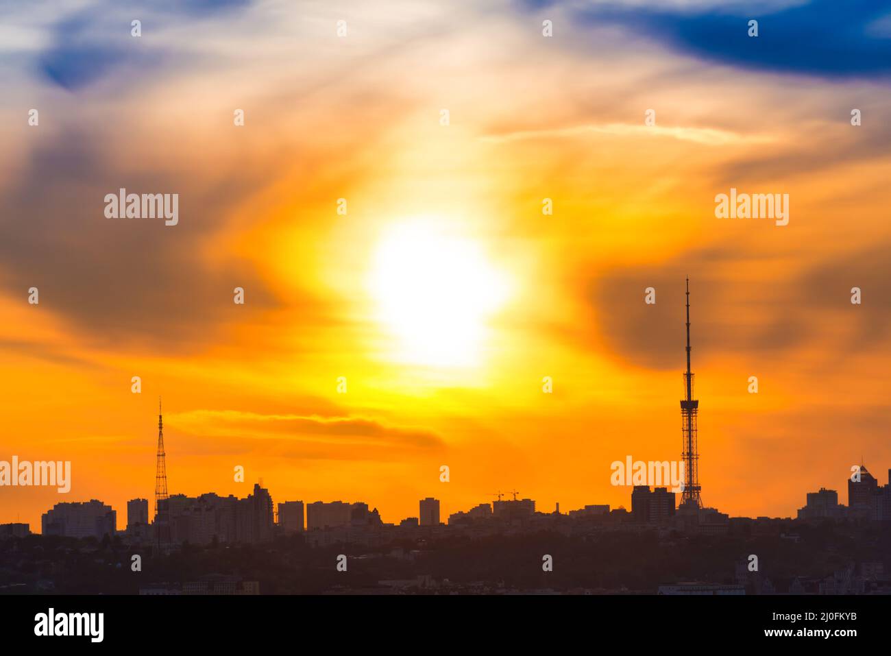 Modern city sunset panorama Stock Photo - Alamy
