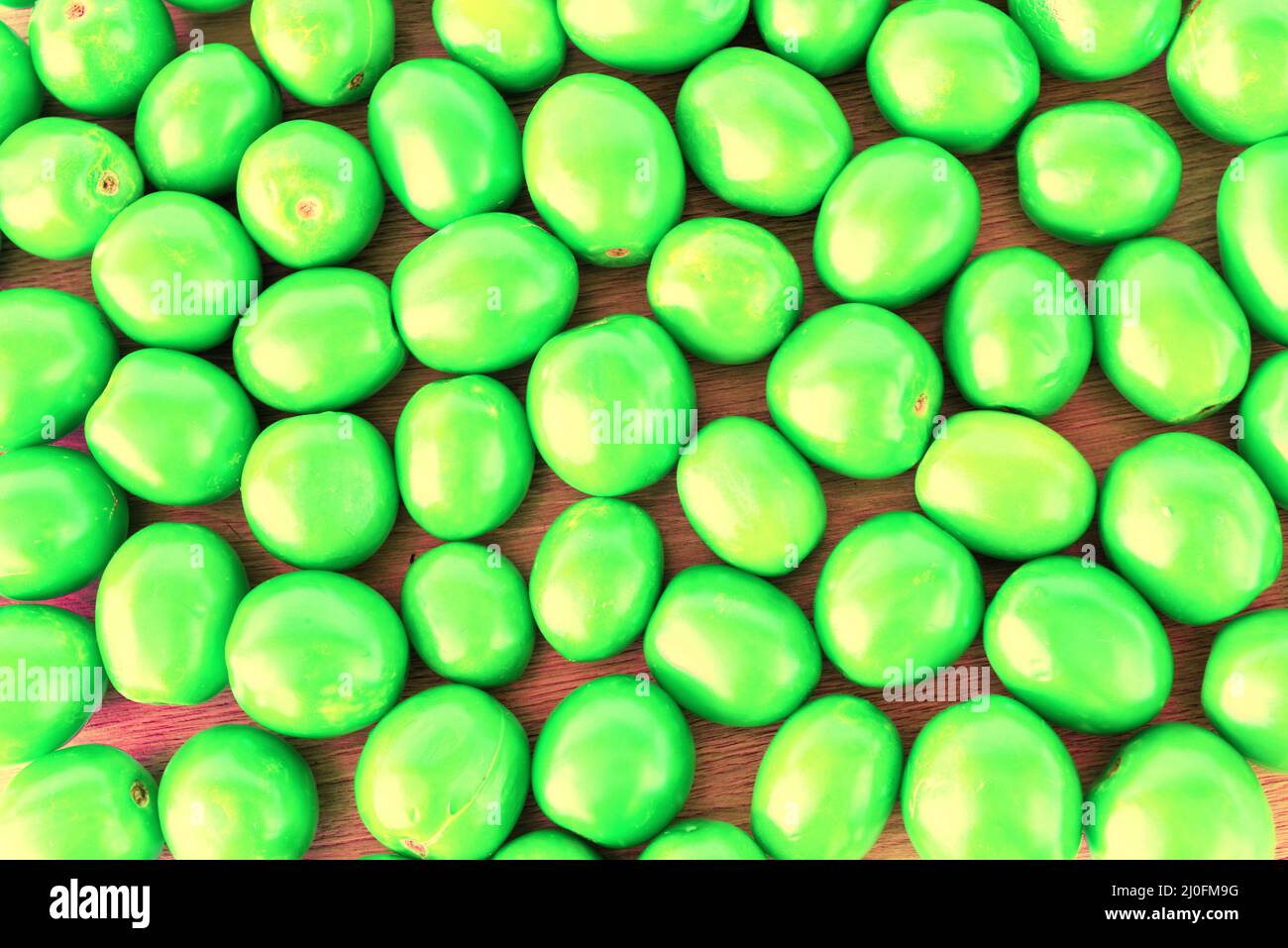 Green tomato food concept Stock Photo - Alamy