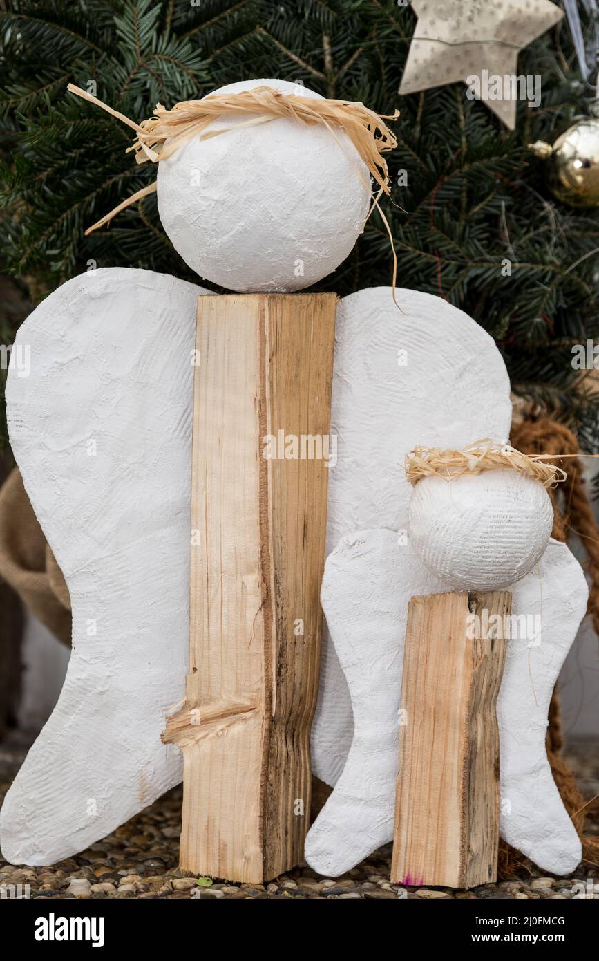 Homemade angels as messengers of peace - close-up Stock Photo - Alamy