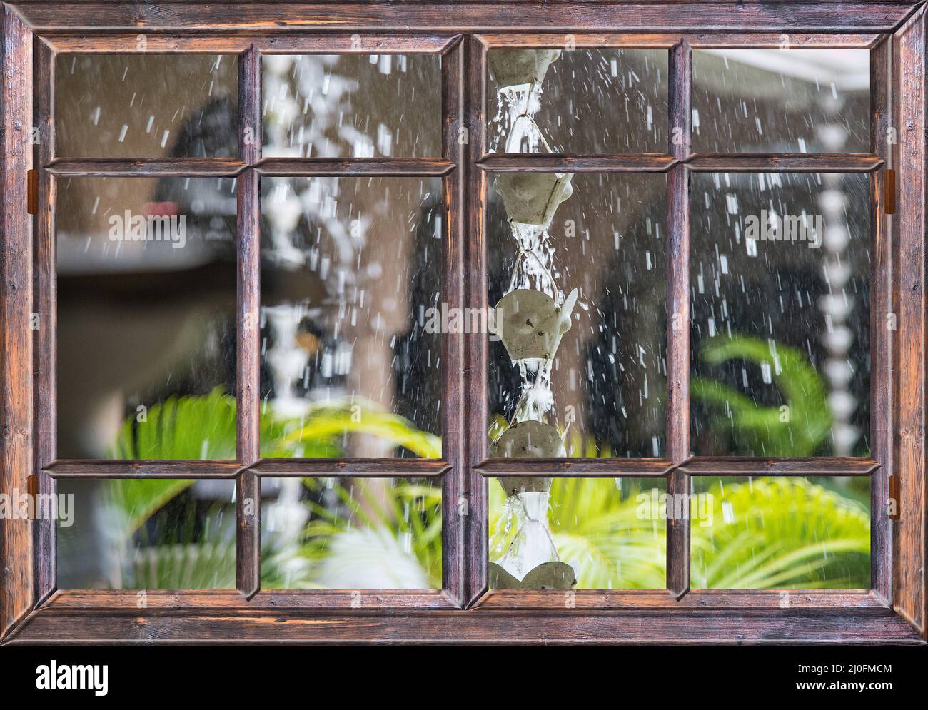 Tropical rain window view Stock Photo - Alamy