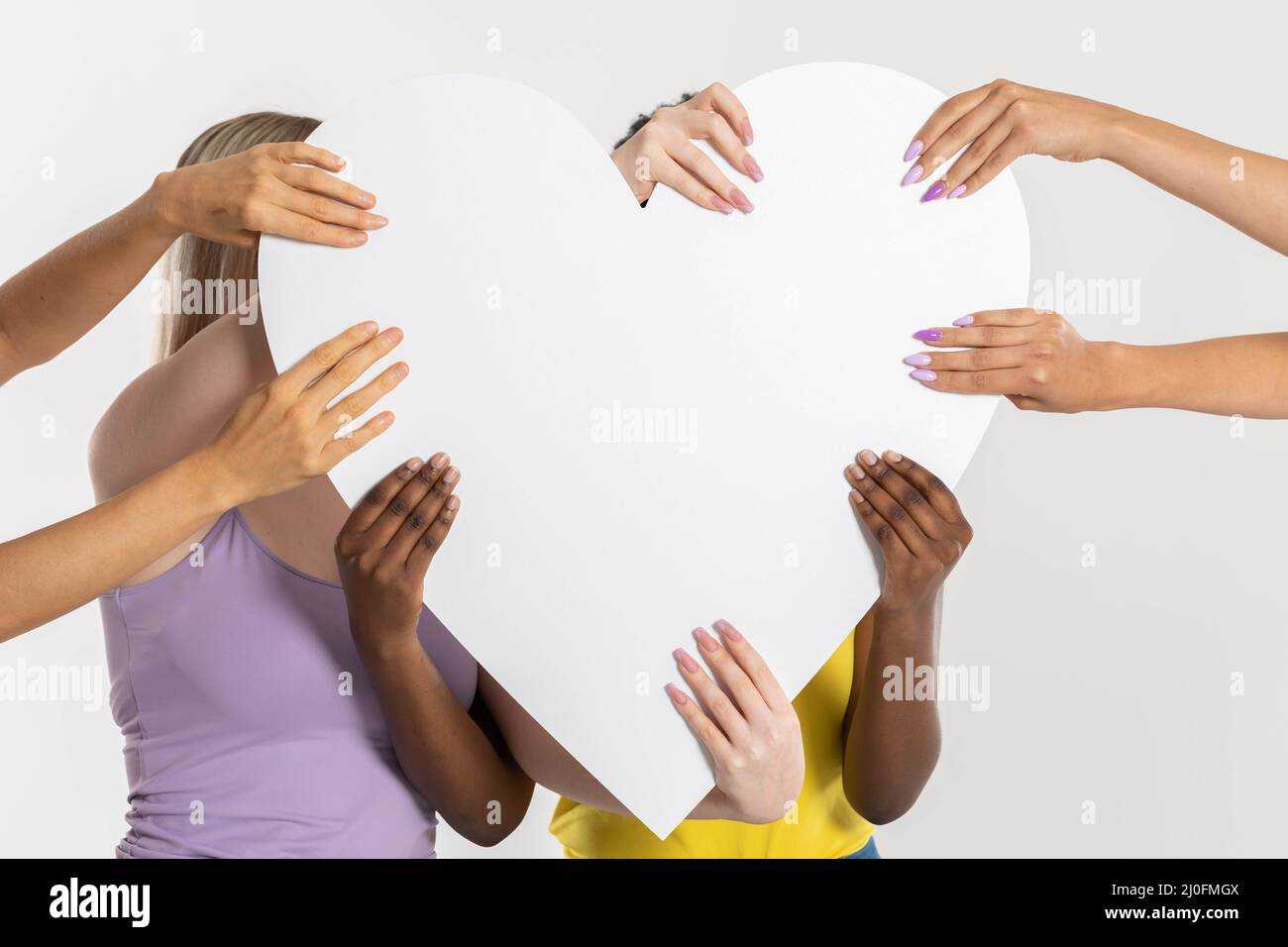 Different races hands hi-res stock photography and images - Alamy