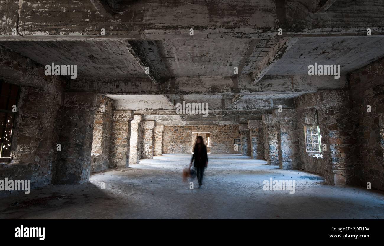 Empty abandoned creepy room whit ghost walking Stock Photo - Alamy
