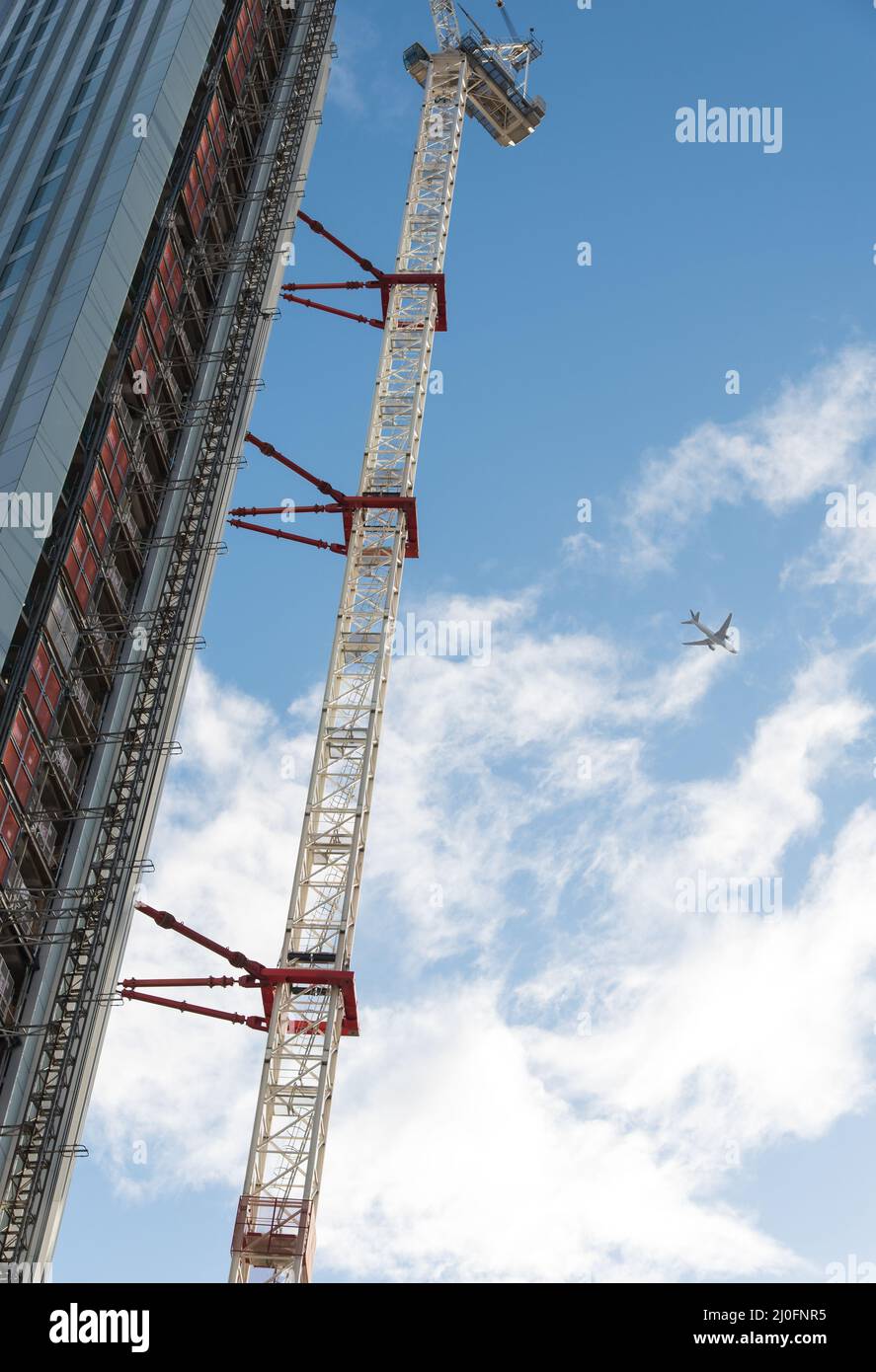 Construction of a modern skyscraper building Stock Photo - Alamy