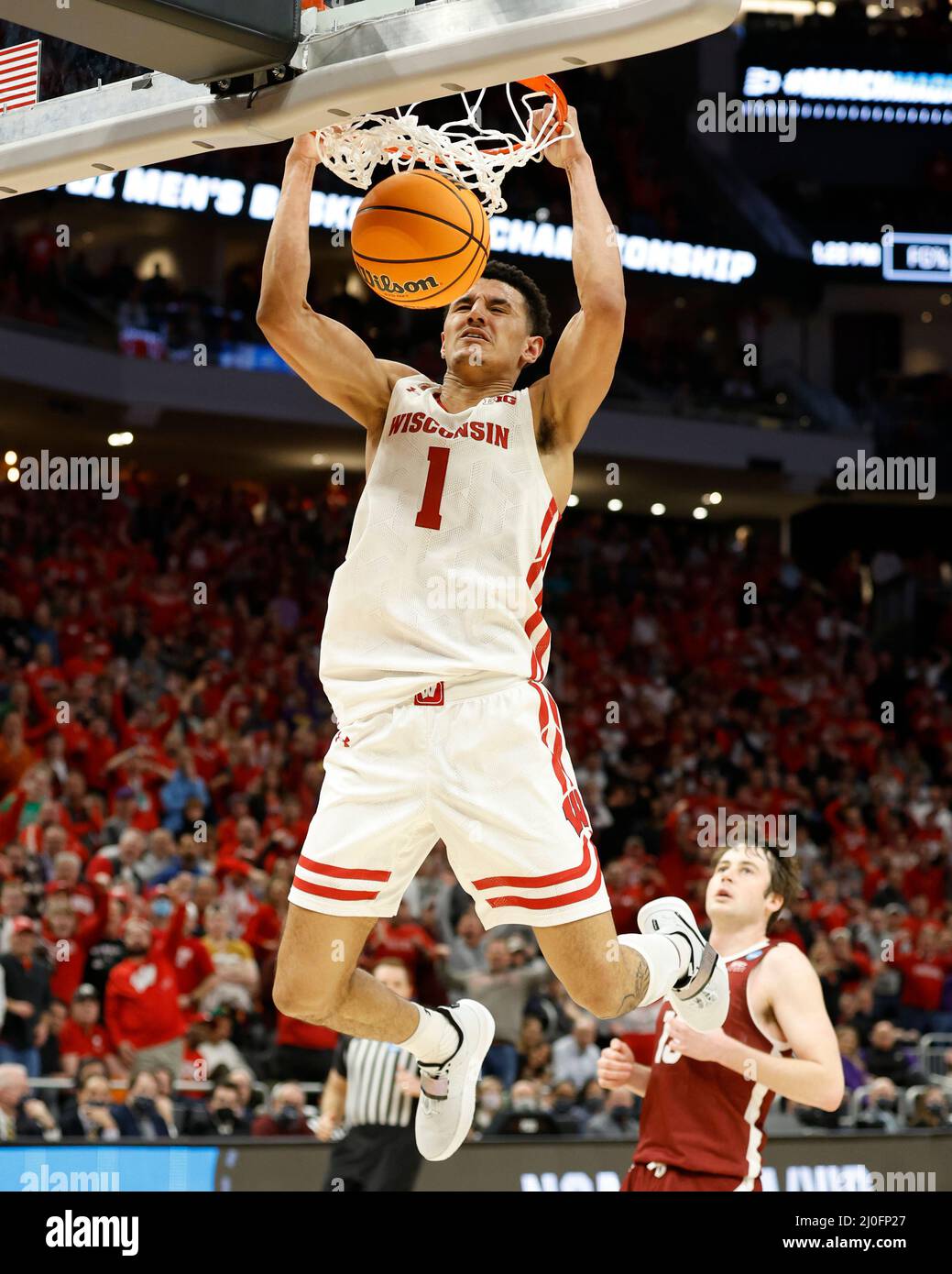 March 18, 2022: Wisconsin Badgers guard Johnny Davis (1) dunks the ball ...