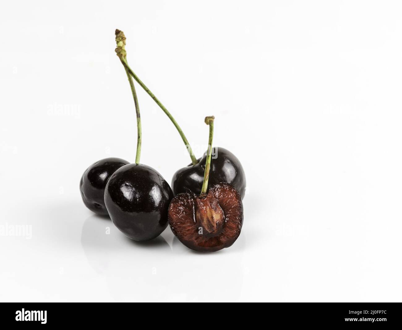 Fresh delicious dark red cherry fruits Stock Photo - Alamy
