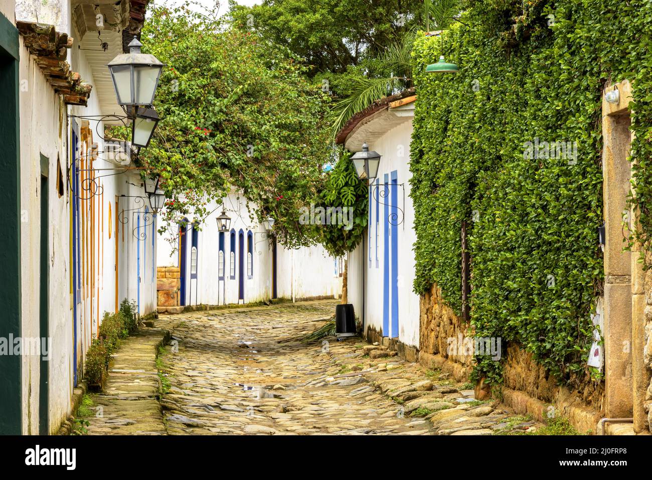 Streets of cobblestone and old historical houses in colonial style on ...