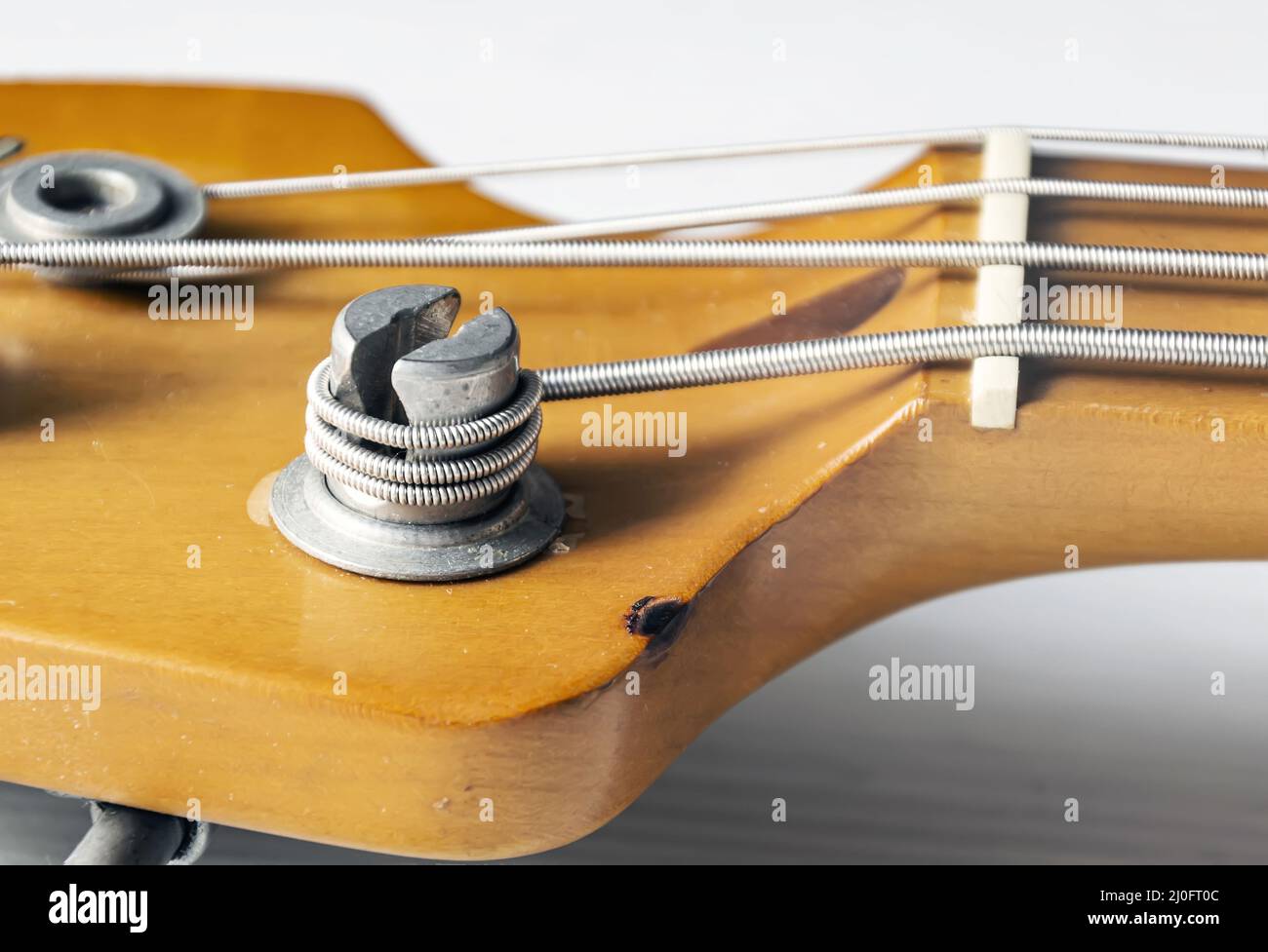 Tuning a bass guitar hi-res stock photography and images - Alamy