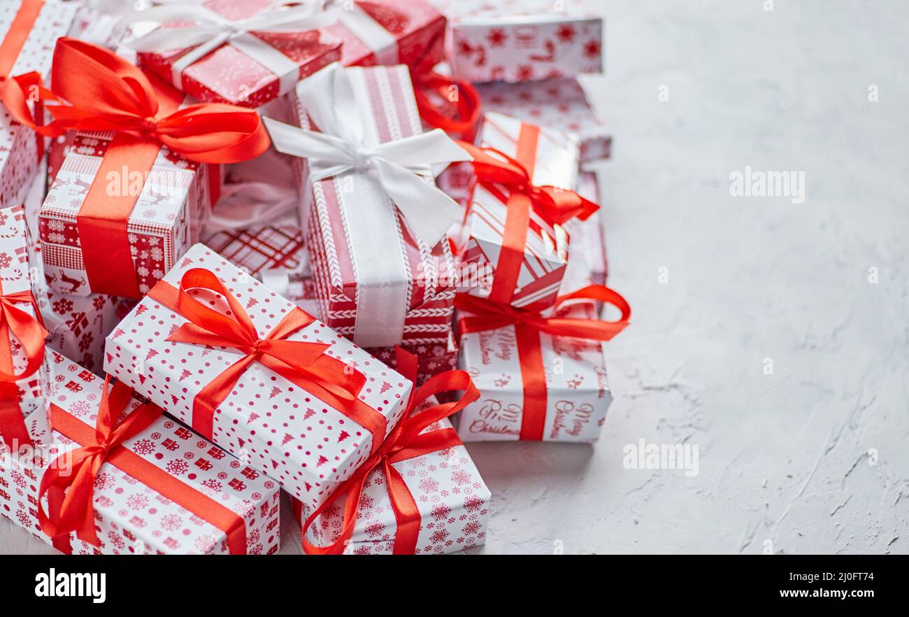 Various pattern and size Christmas boxes placed on white background ...