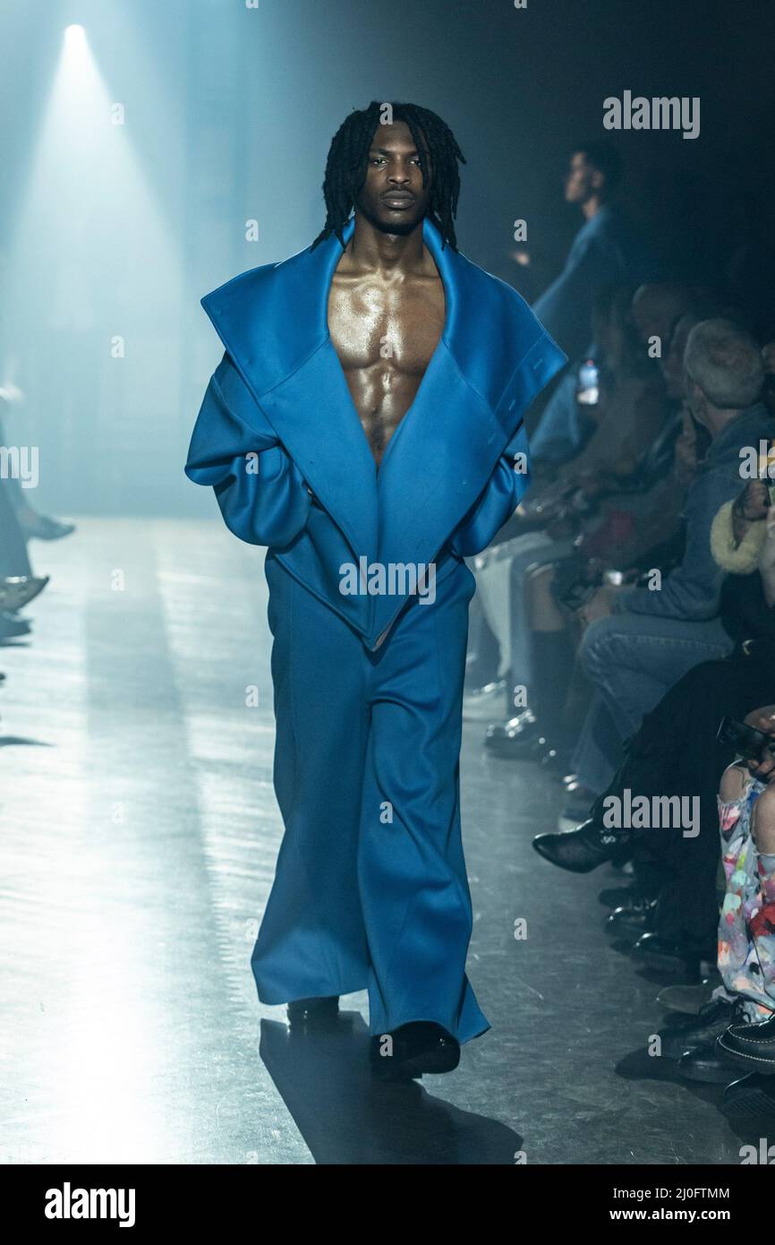 New York, USA. 18th Mar, 2022. Model walks runway for designer Willy ...