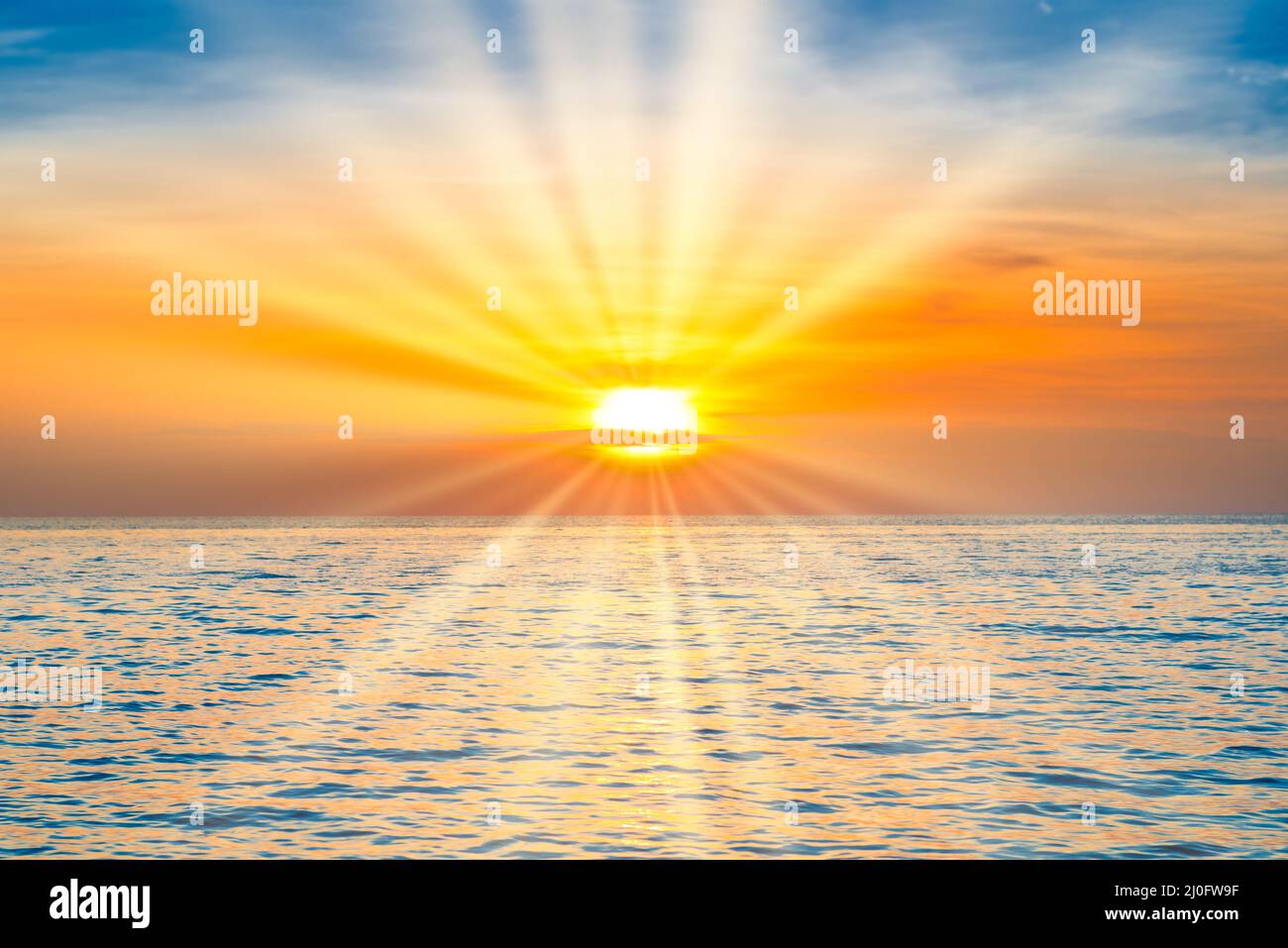 Sunset sea wave sun rays hi-res stock photography and images - Alamy