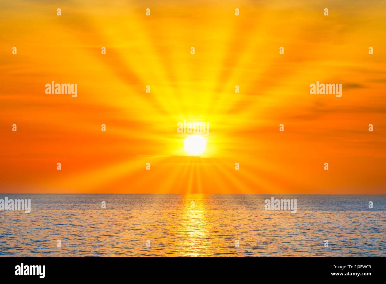 Sunset sea wave sun rays hi-res stock photography and images - Alamy
