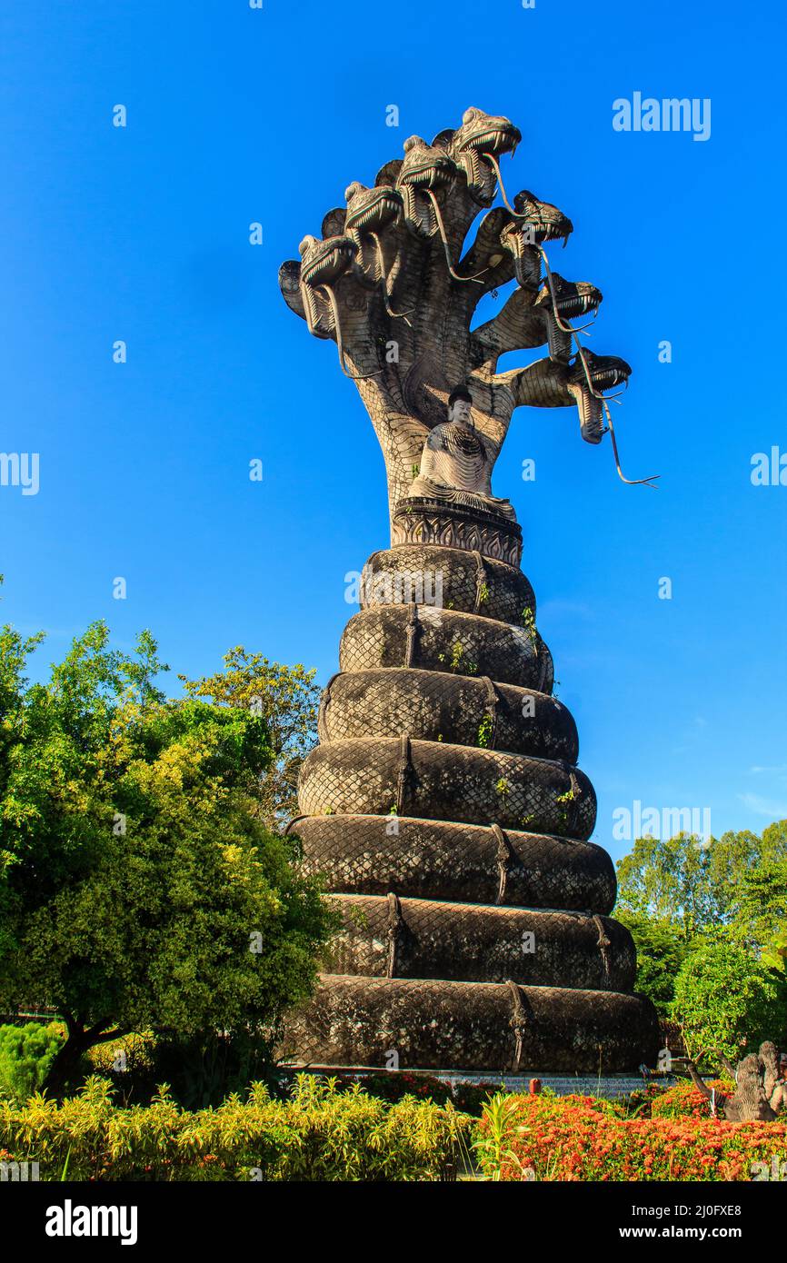 The sculpture of King of naga (7 heads) protecting the Buddha from ...