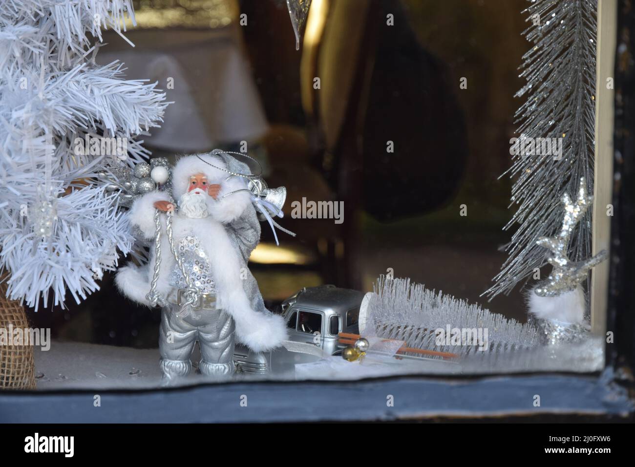 glamorous father christmas in window display, england Stock Photo - Alamy
