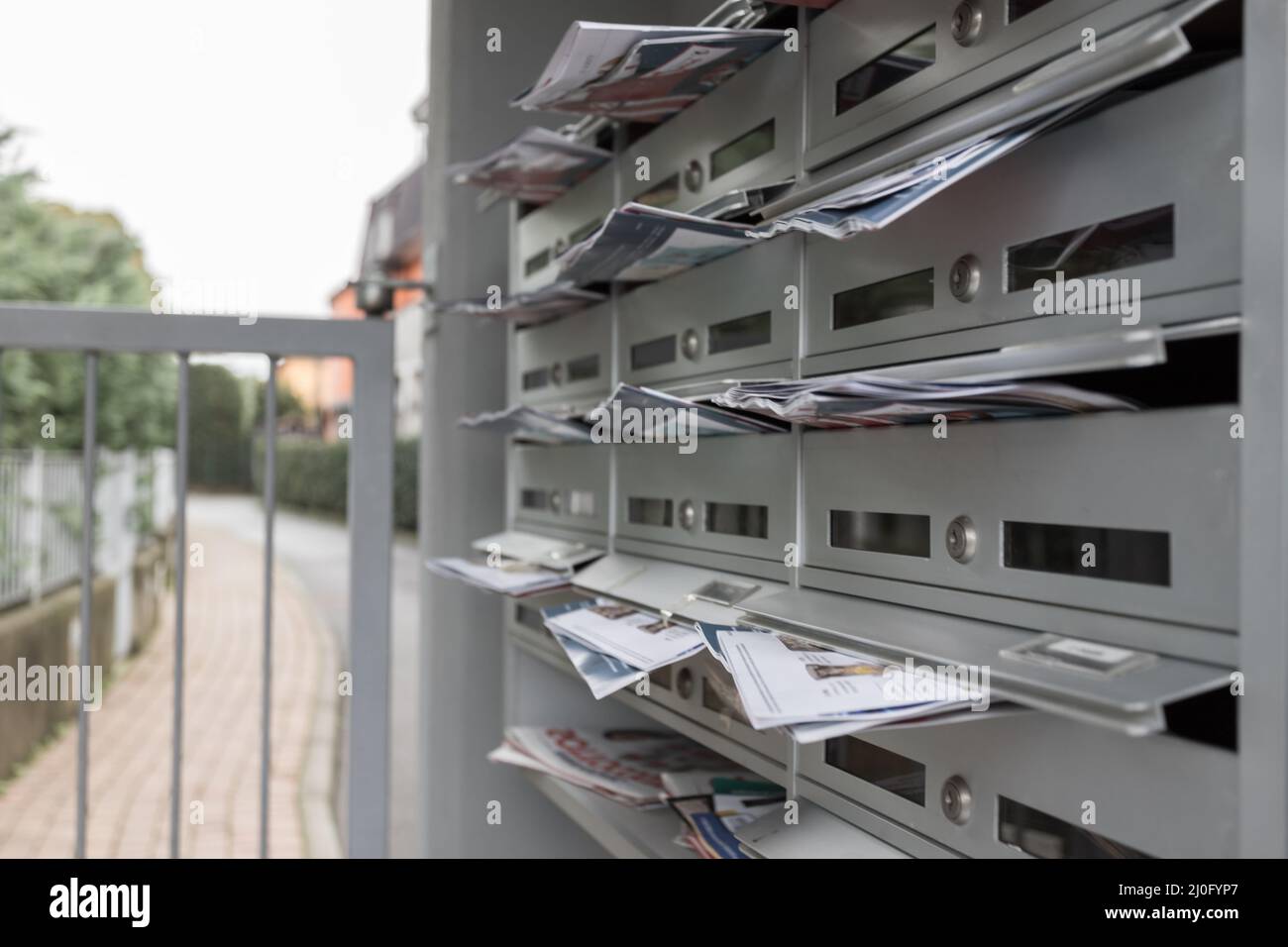 Full mailboxes hi-res stock photography and images - Alamy