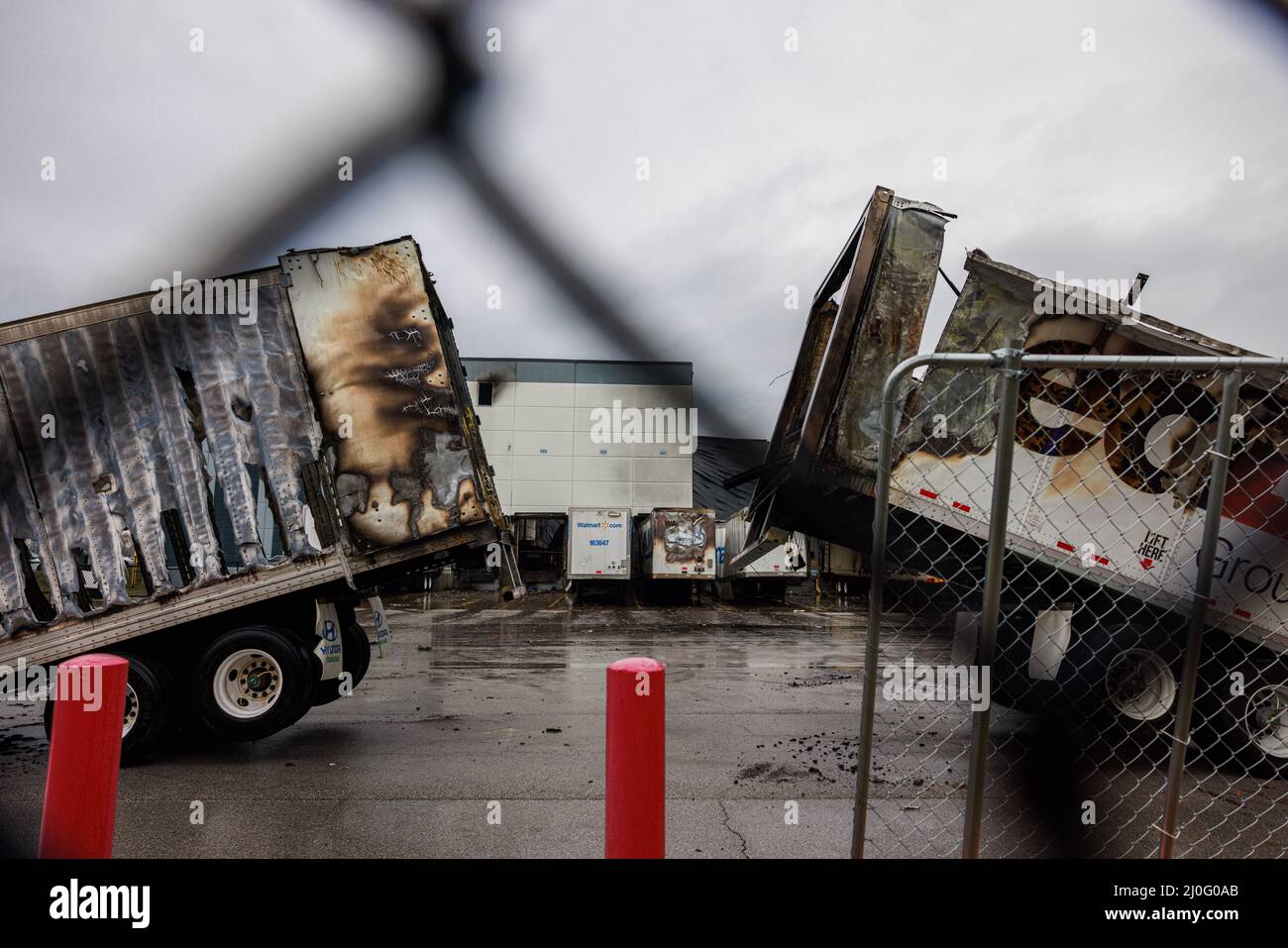 Semi-trailers are burnt after a fire that destroyed the Walmart ...