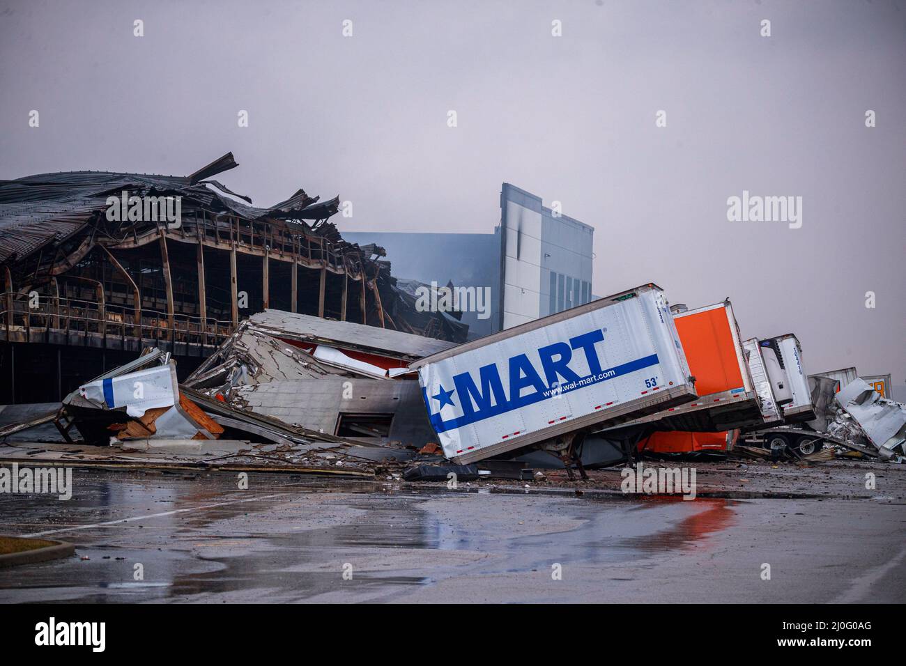 Semi-trailers are burnt after a fire that destroyed the Walmart ...