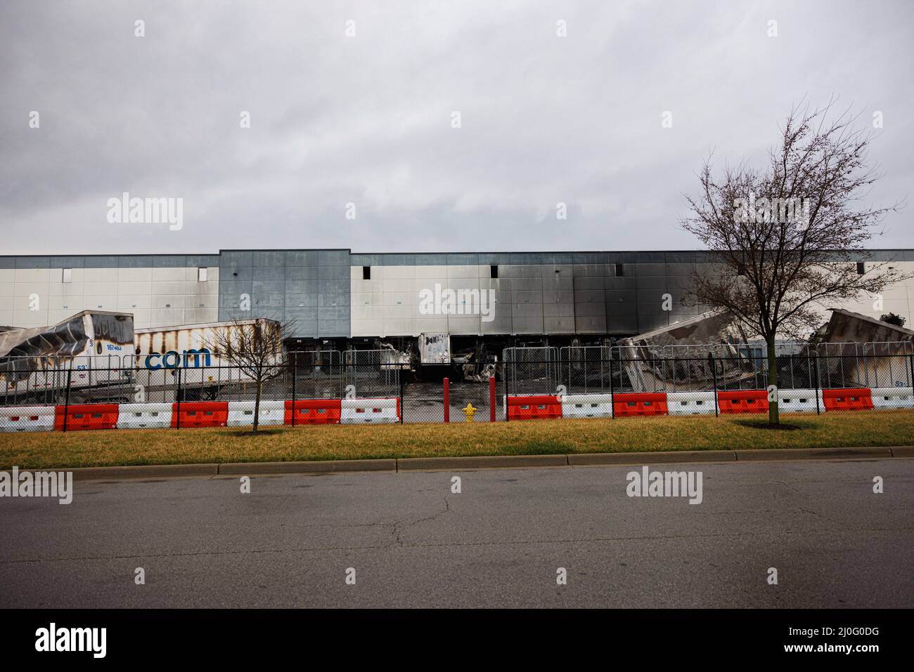 Semi-trailers are burnt after a fire that destroyed the Walmart ...