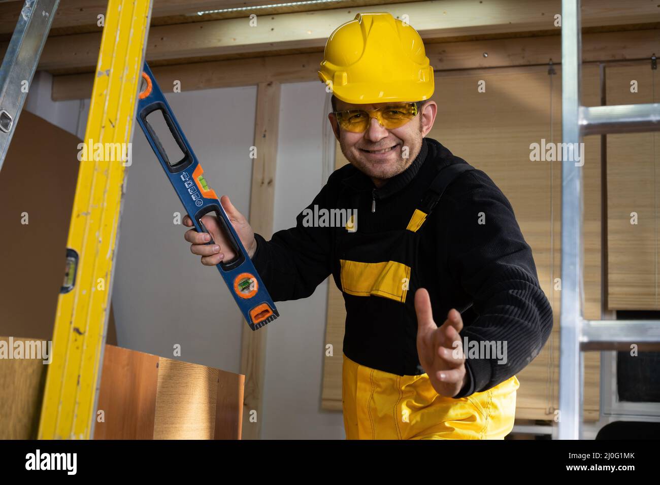 Smiling construction worker hi-res stock photography and images - Alamy