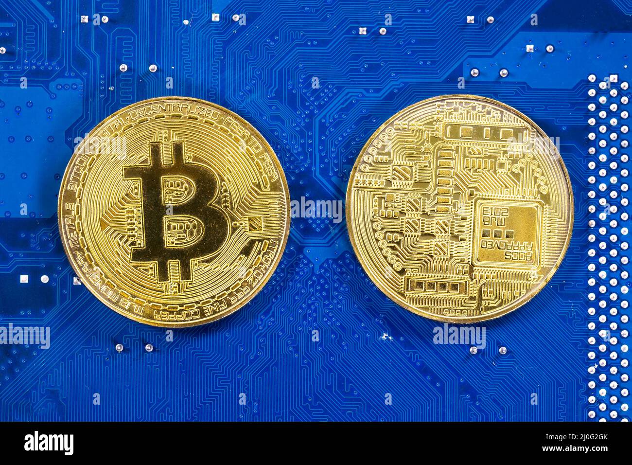Bitcoin coins and printed circuit board PCB Stock Photo - Alamy