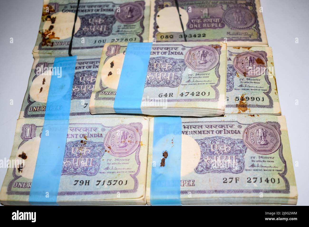 Old One Rupee notes combined on the table, India money on the rotating ...
