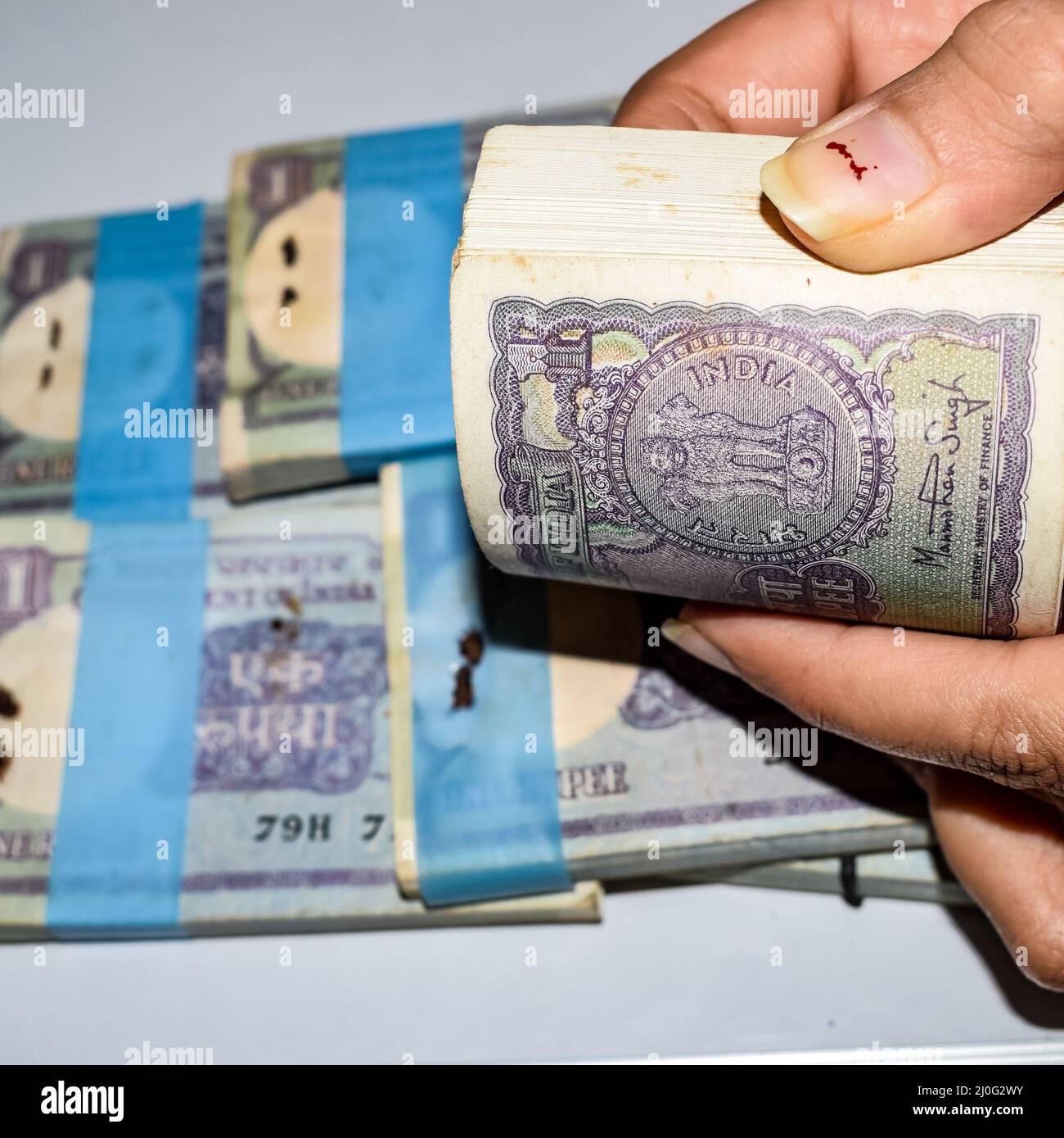 Old One Rupee notes combined on the table, India money on the rotating ...