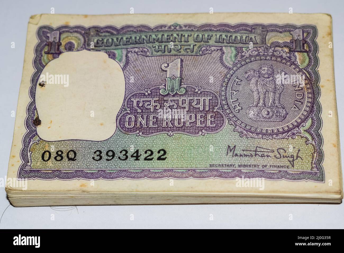 Old One Rupee notes combined on the table, India money on the rotating ...